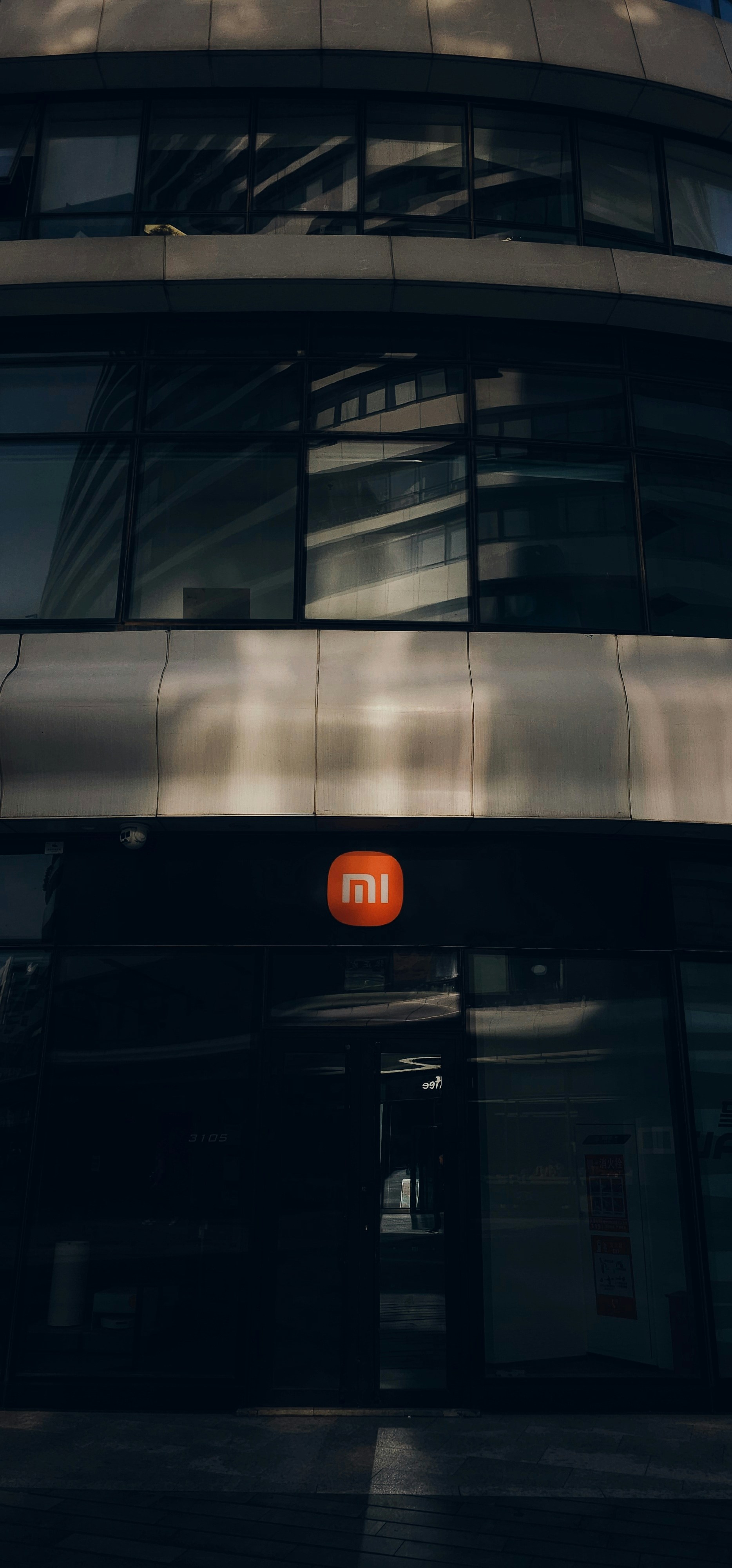 Xiaomi logo on a modern building facade