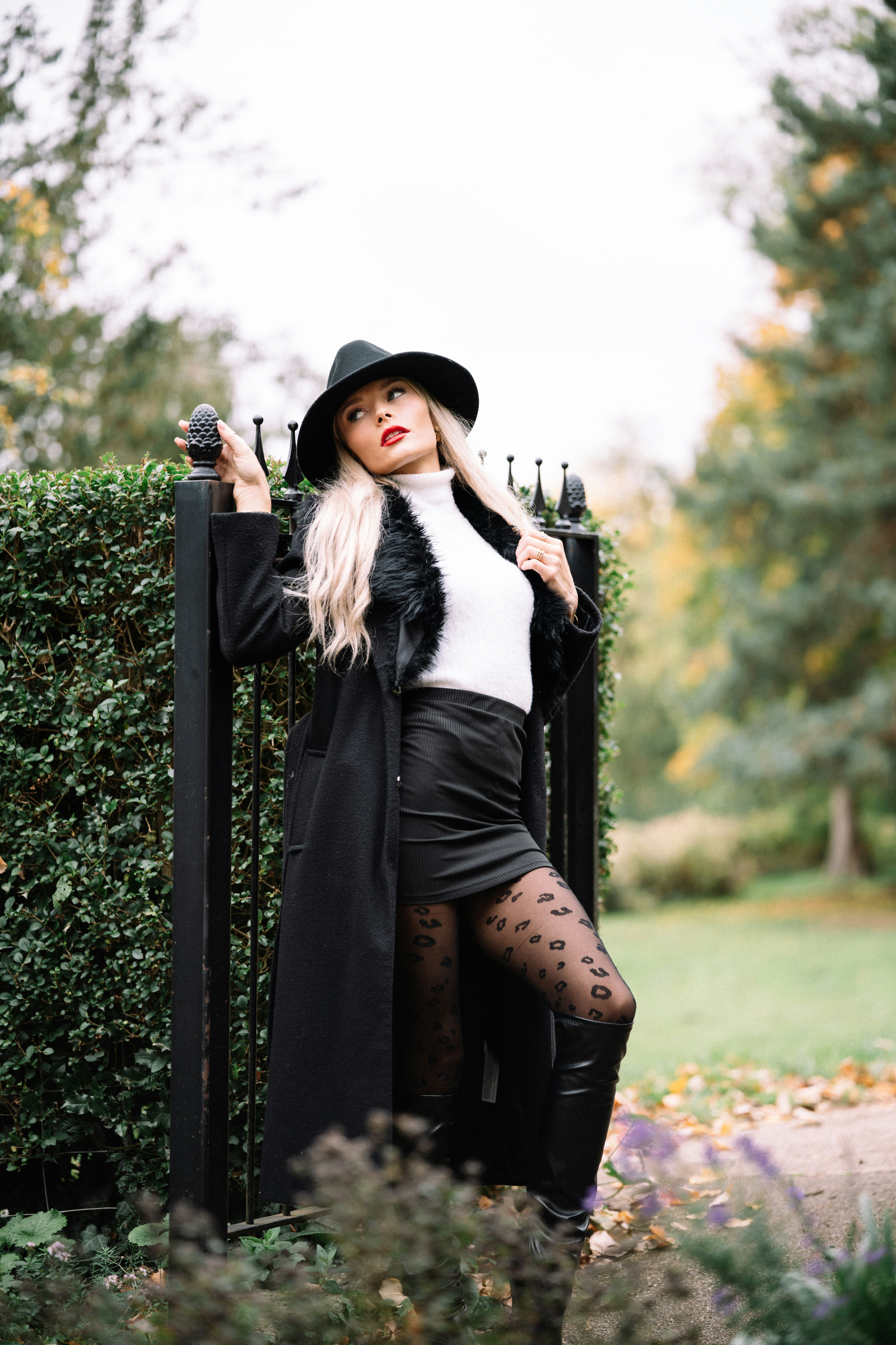 Velvet & Iron: Autumn Gate Portrait of Confidence