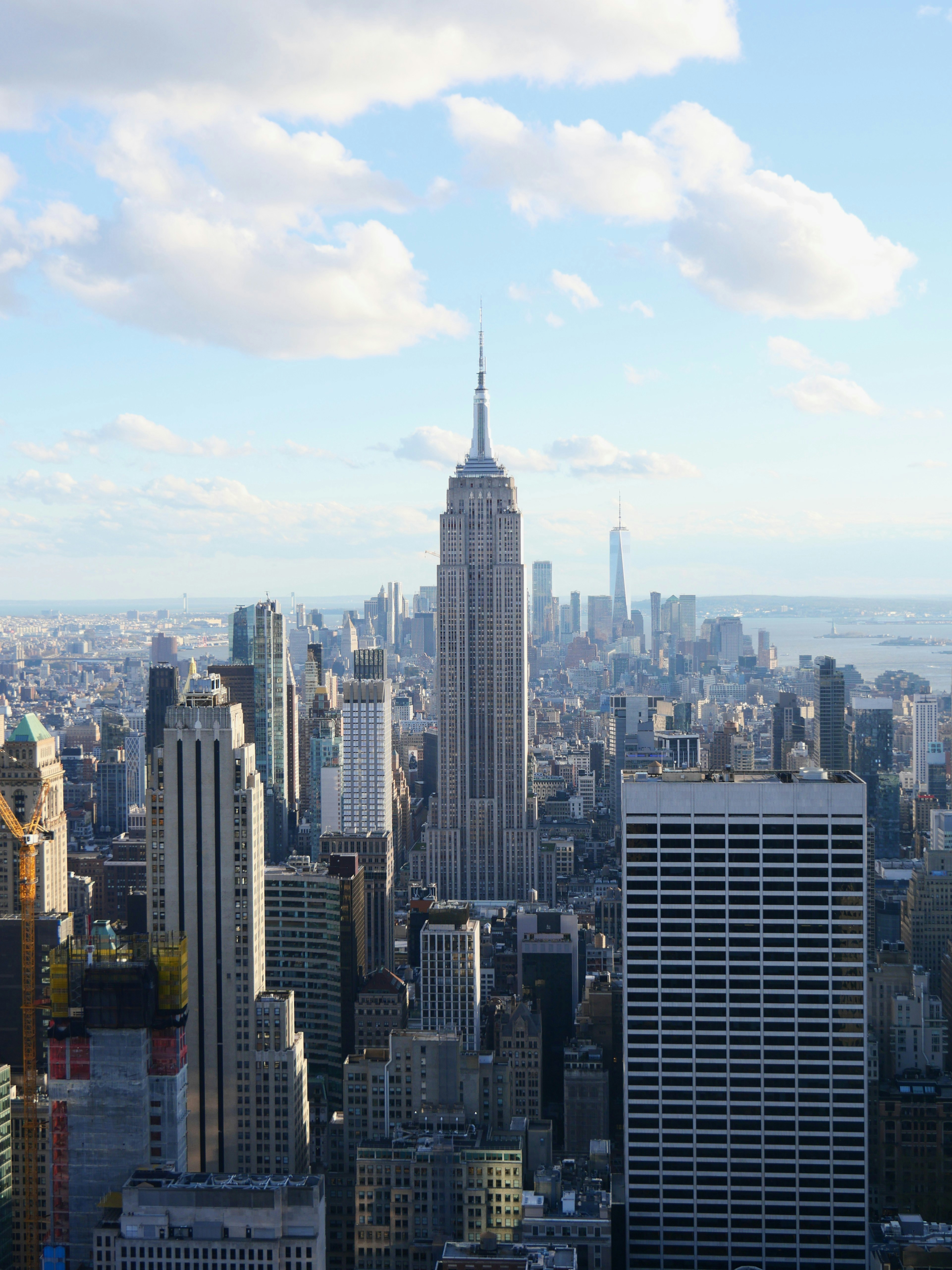 Empire state building towering over new york city skyline