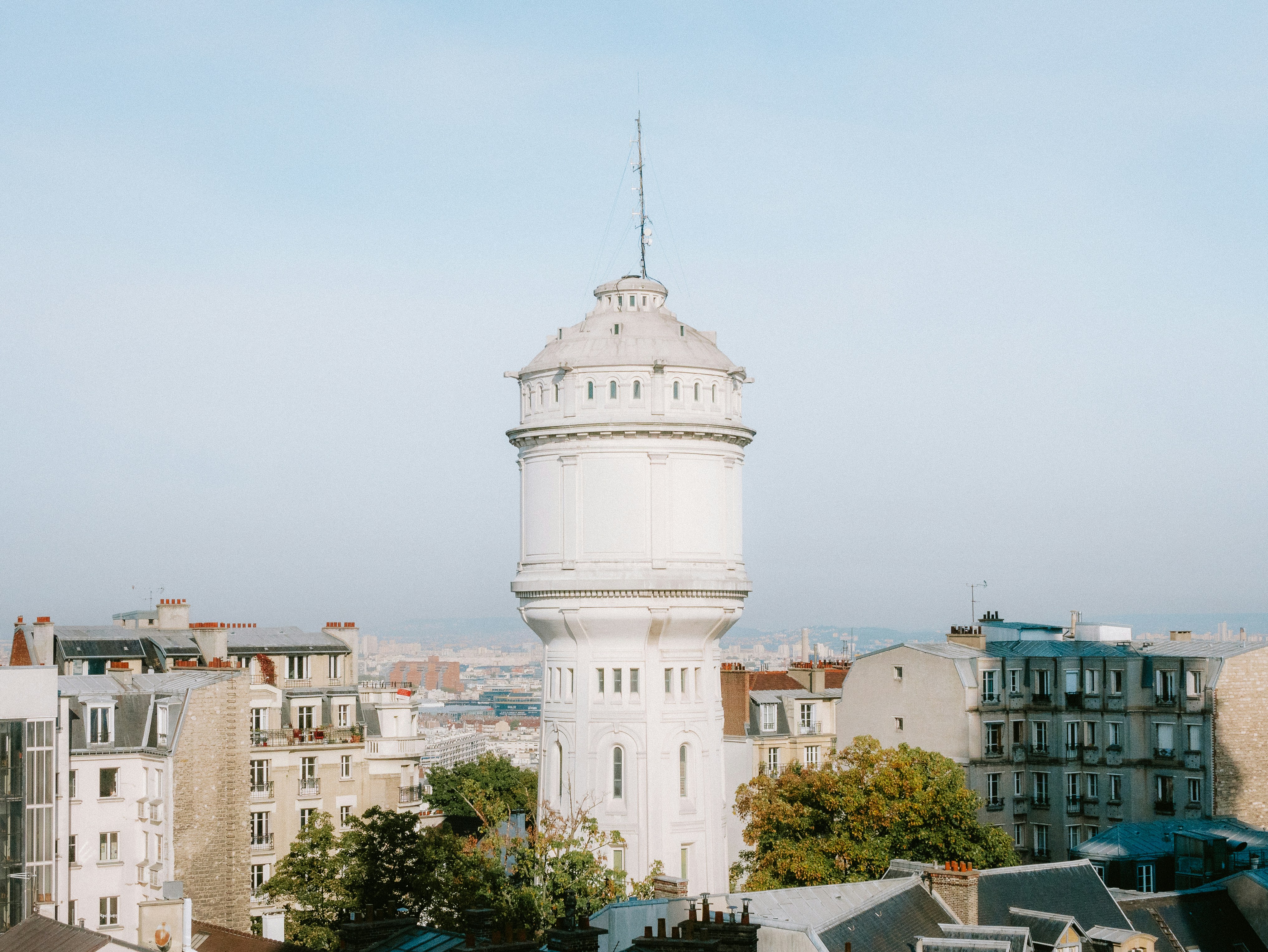 The Urban Sentinel: A Water Tower's Perspective