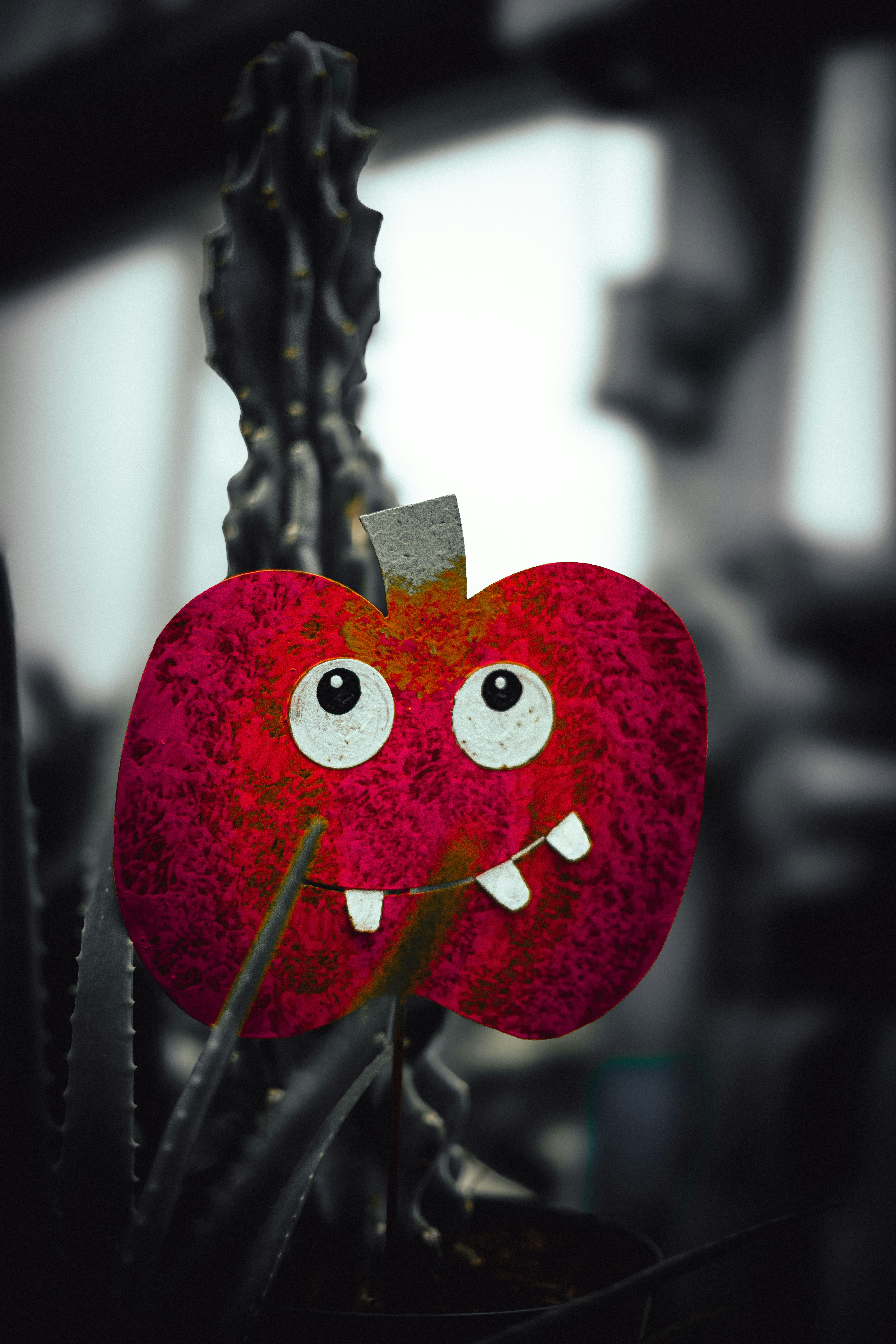 Whimsical Fruit Character Amidst Nature's Shadows