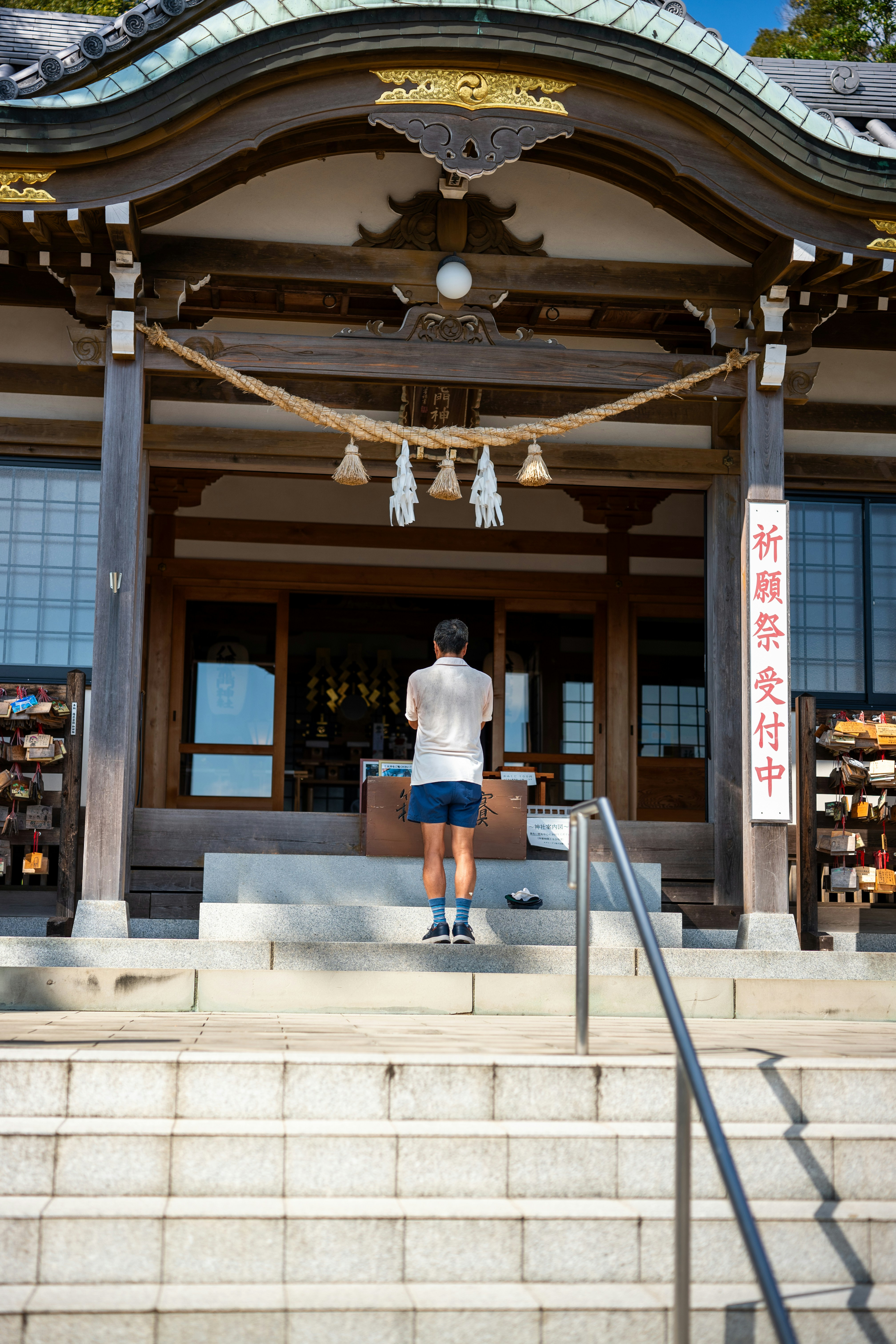 A Moment of Reflection at the Shrine