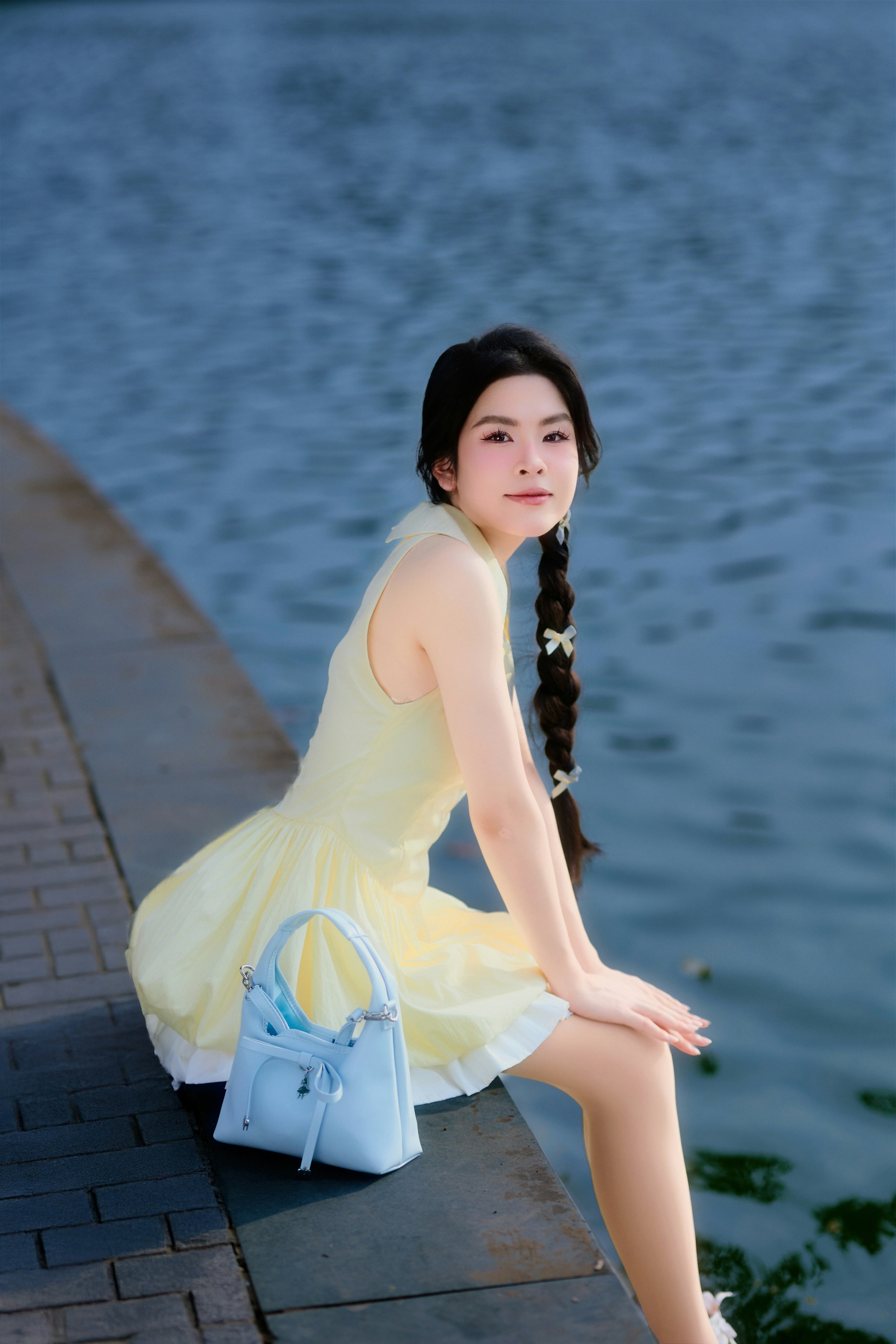 Woman with braided hair by the water photo – Free Lake Image on Unsplash