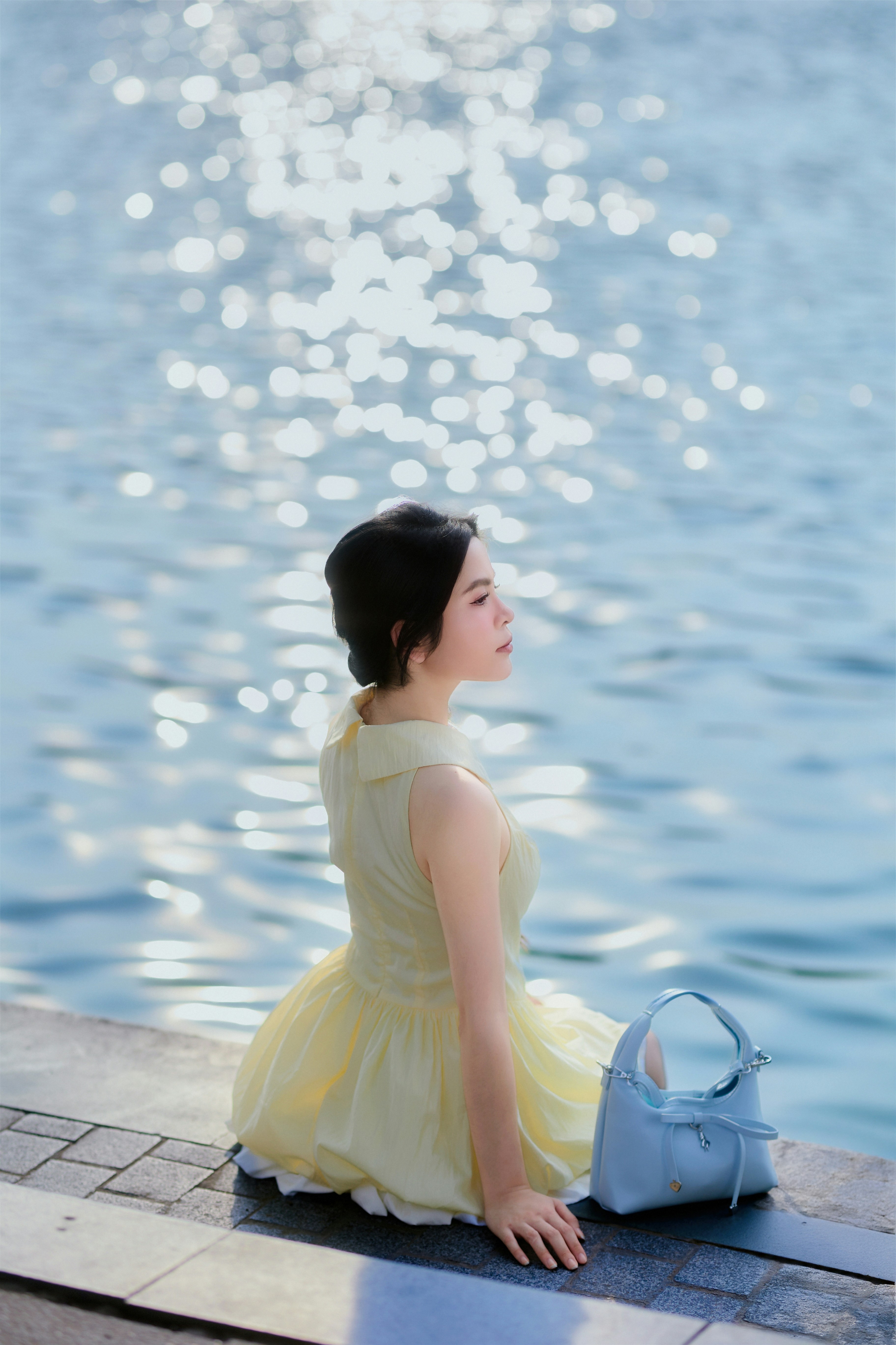 Dappled Waters and a Yellow Dress: A Quiet Riverside Portrait