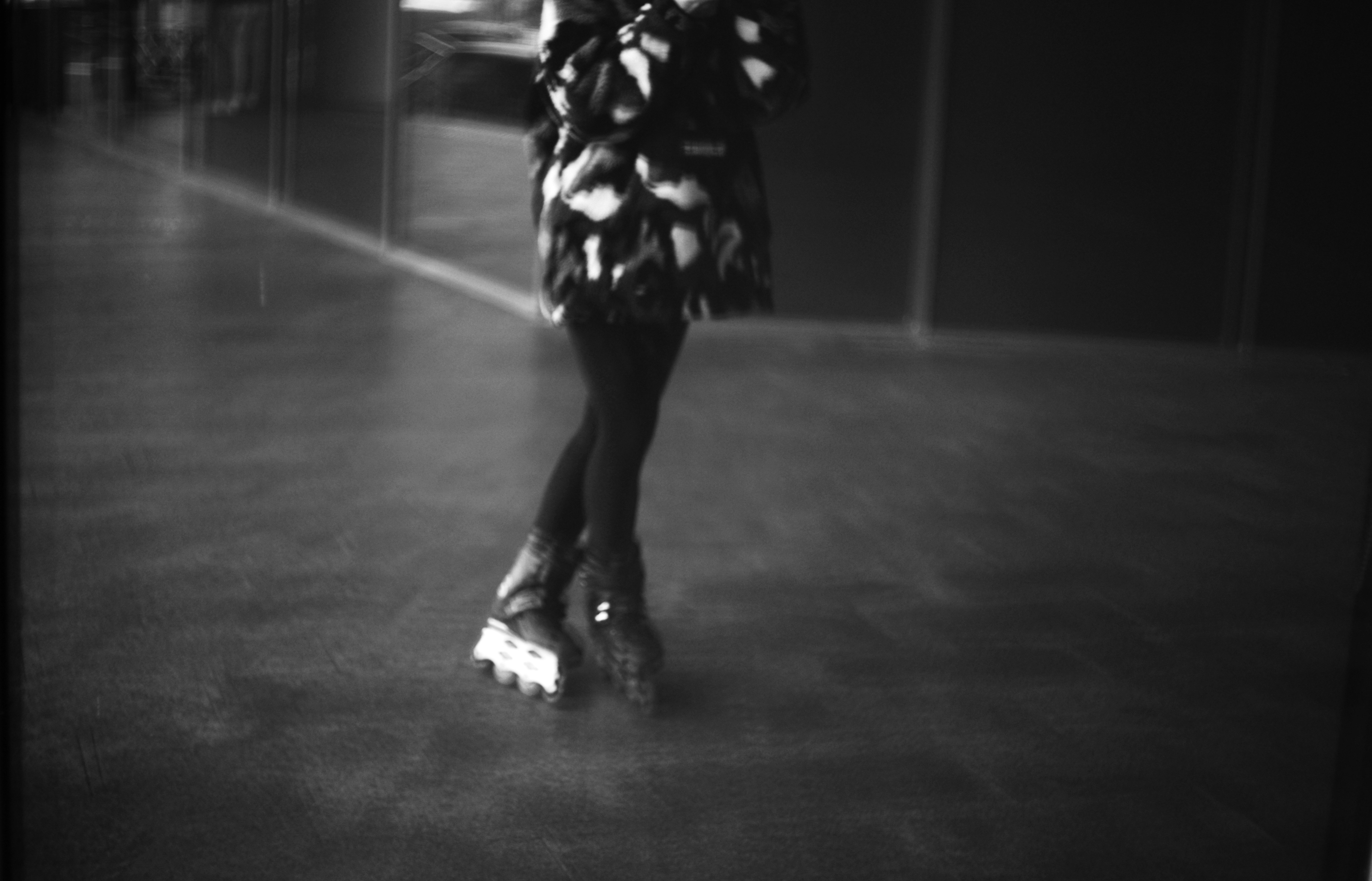 Gliding Through Shadows: A Roller Skater's Dance