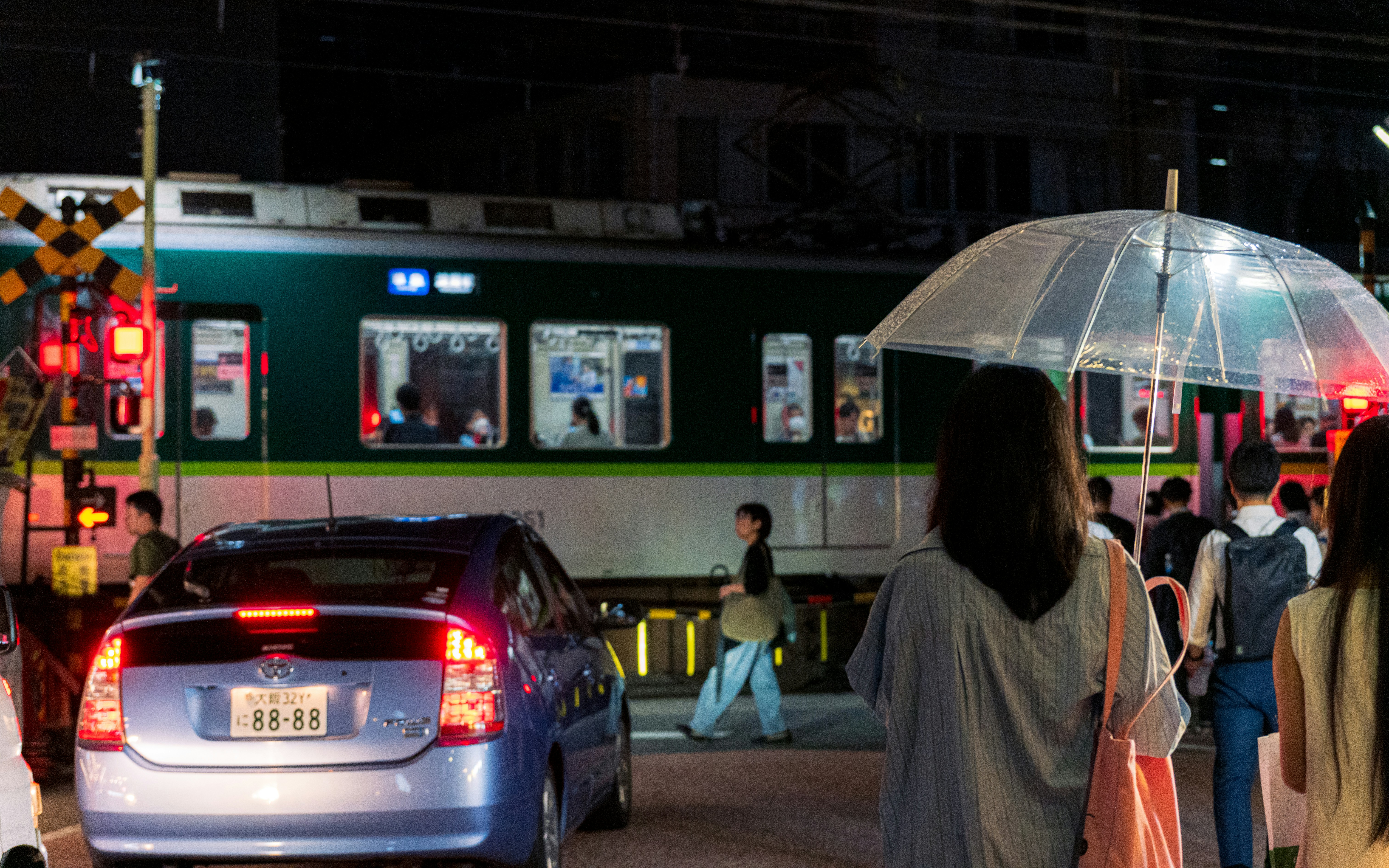 Urban Evening Commute Under Rainy Skies