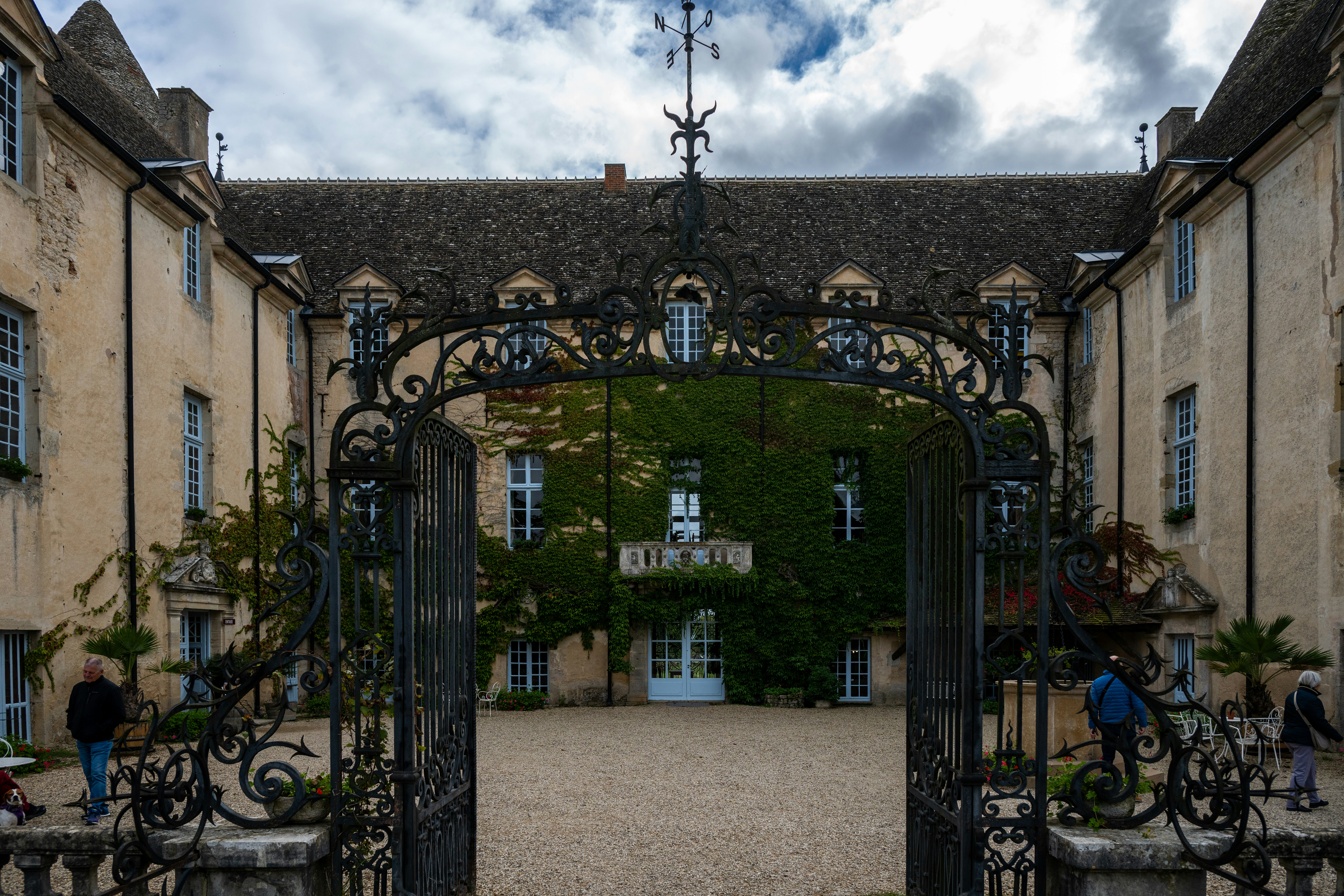 Ivy-Framed Gate to a Quiet Manor Courtyard