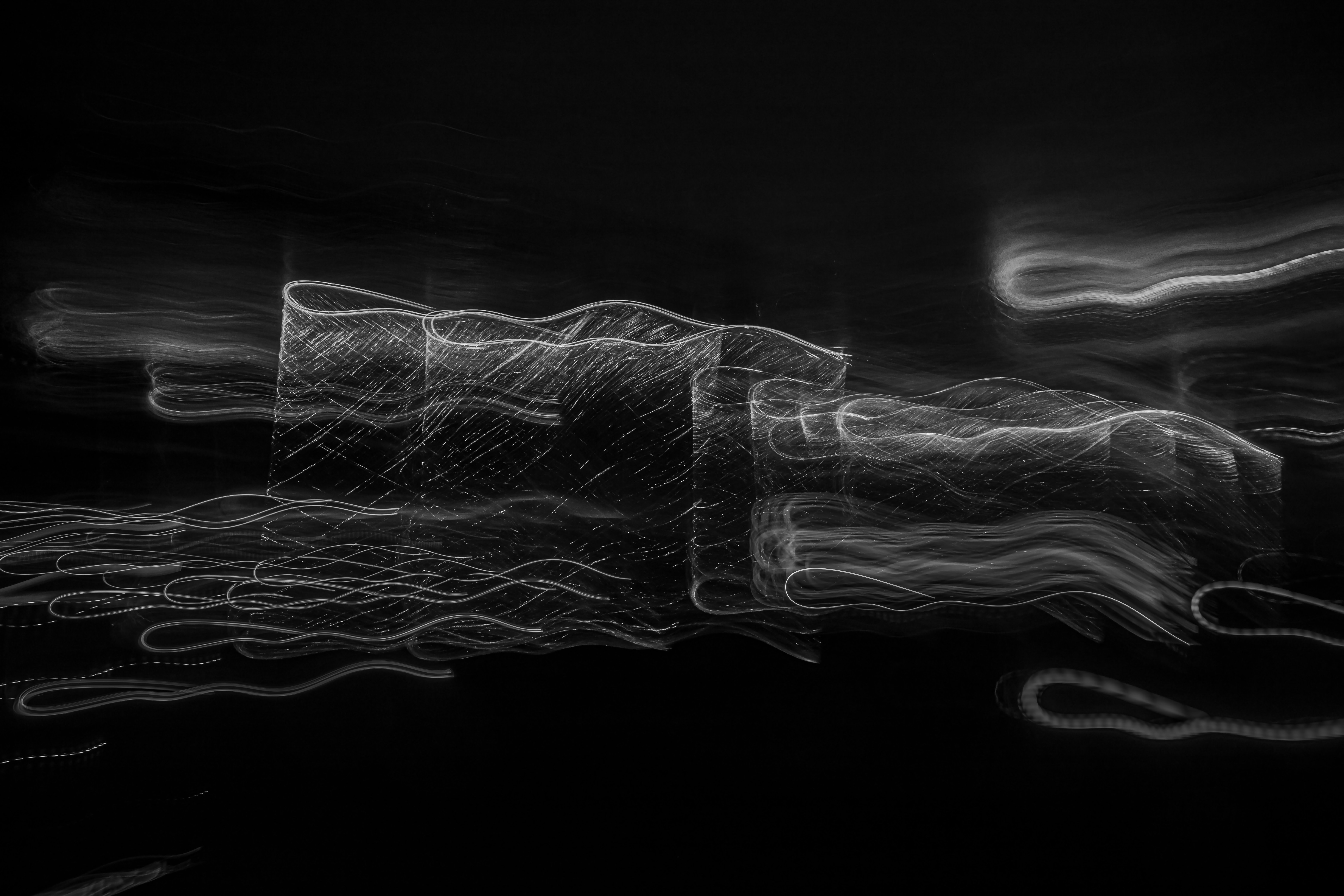 Abstract light streaks on a dark background