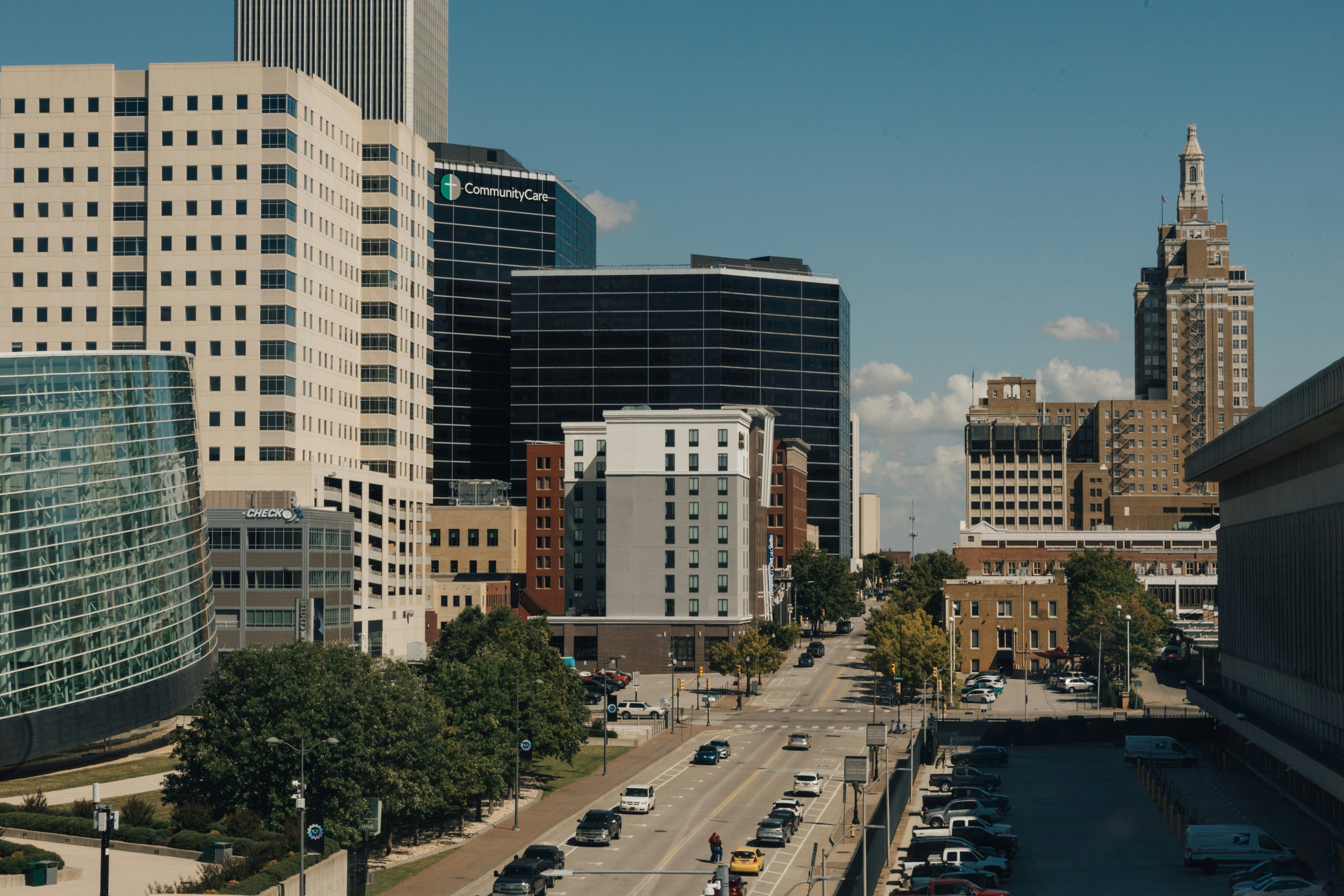 City skyline with modern buildings and cars on road