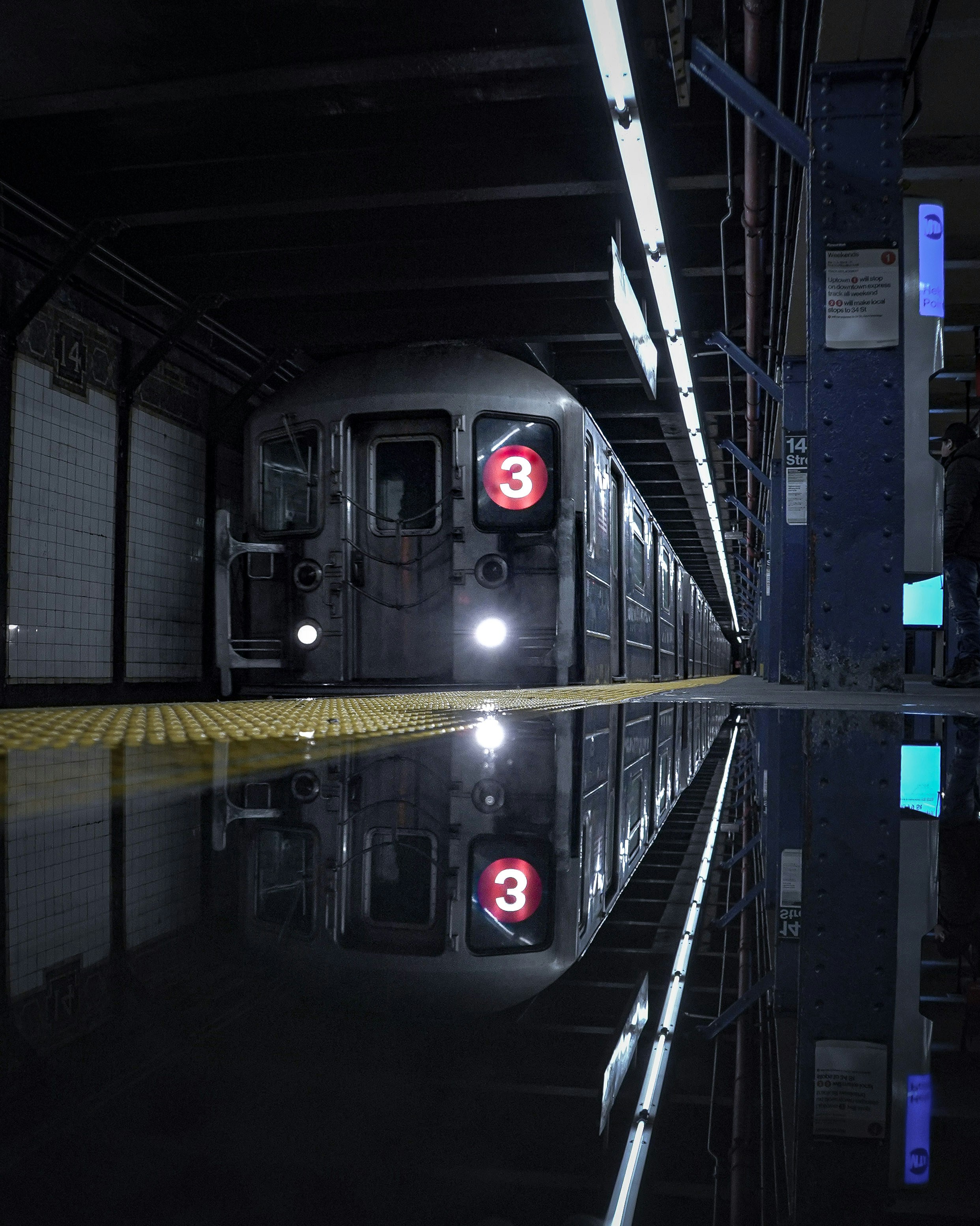 Underground Doorway: A Lone Train at the Quiet Platform