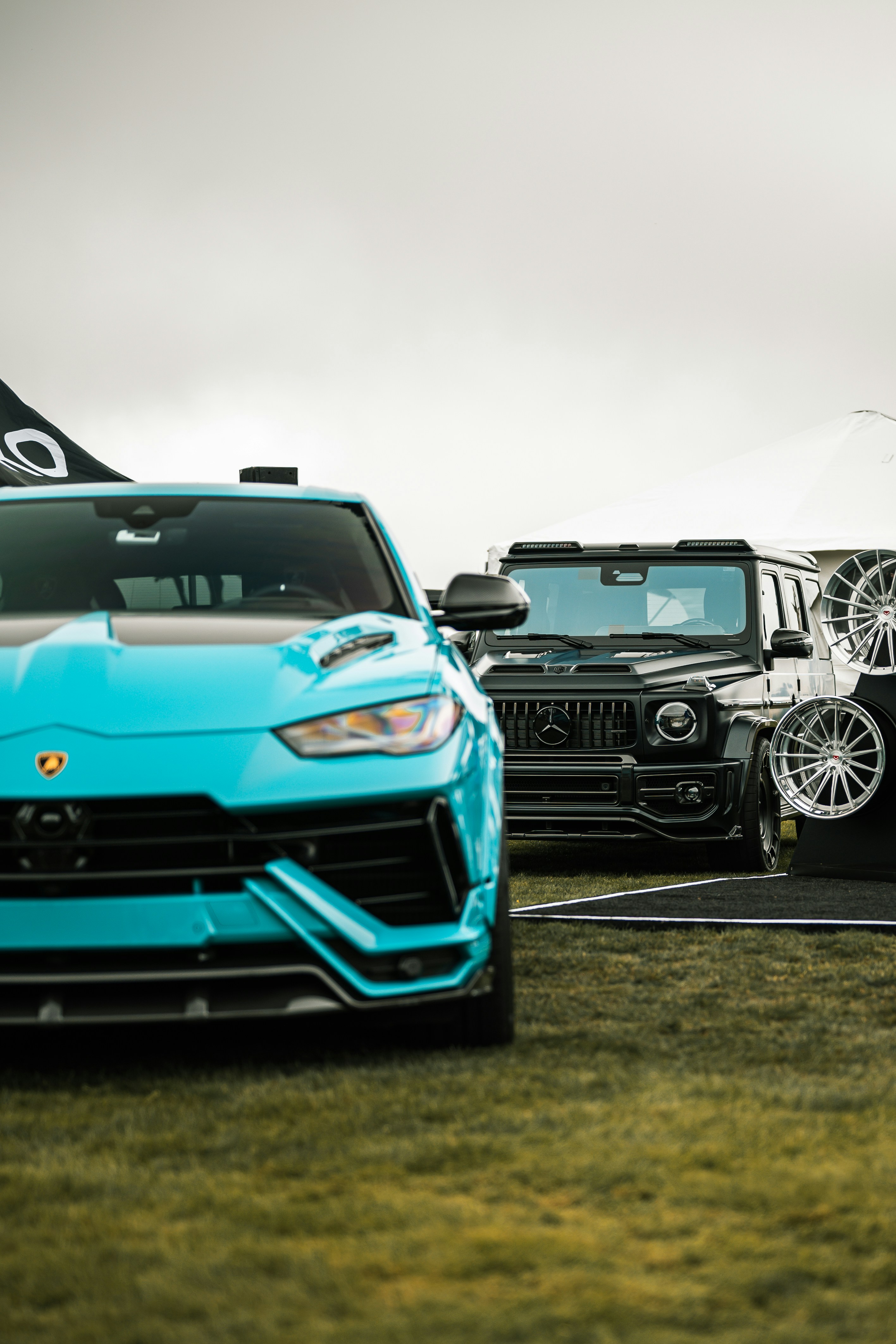 Turquoise Lamborghini Urus Anchors an Exotics Display