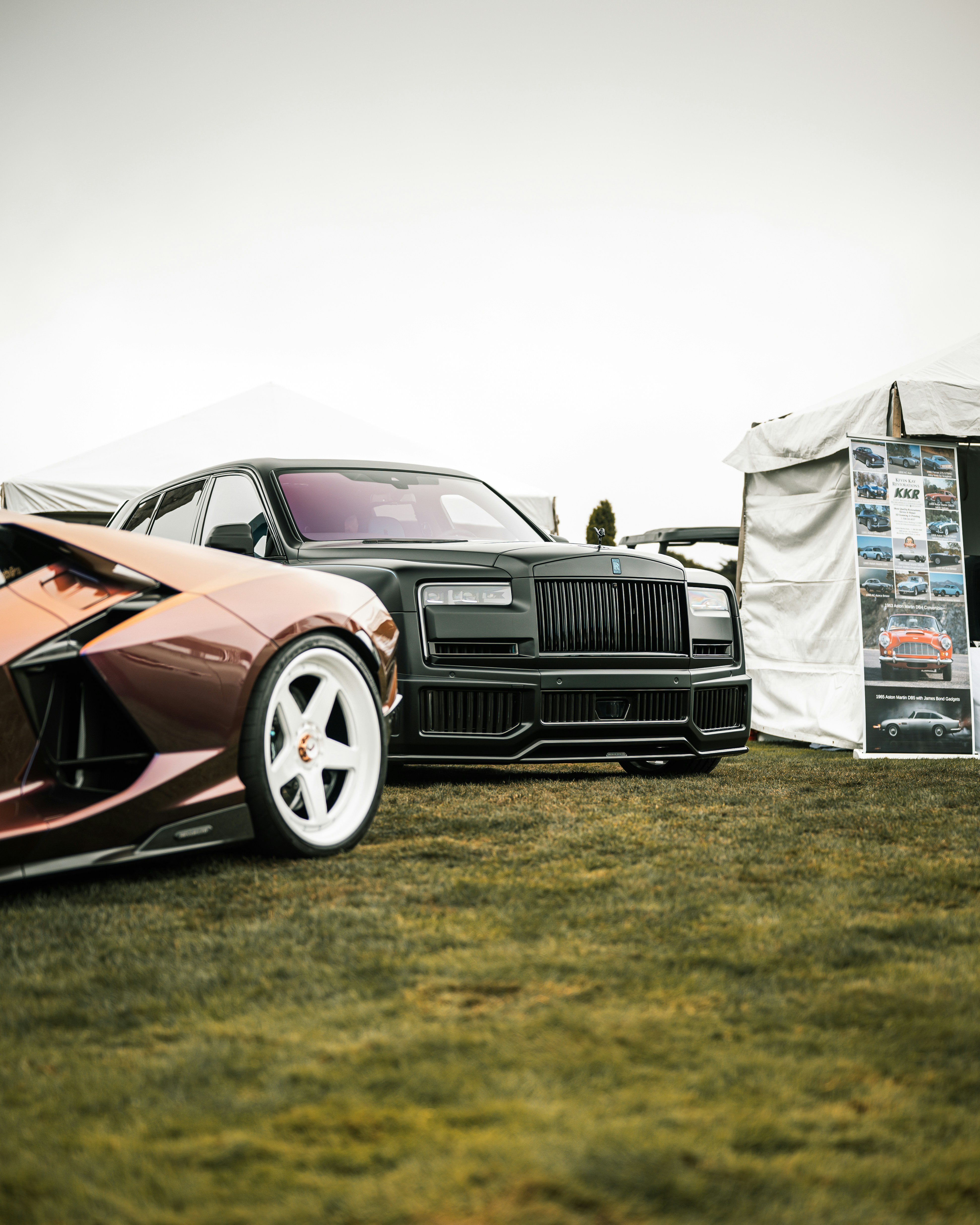 Grille Guardian: A Black Rolls-Royce Cullinan Anchors a Weekend Car Show