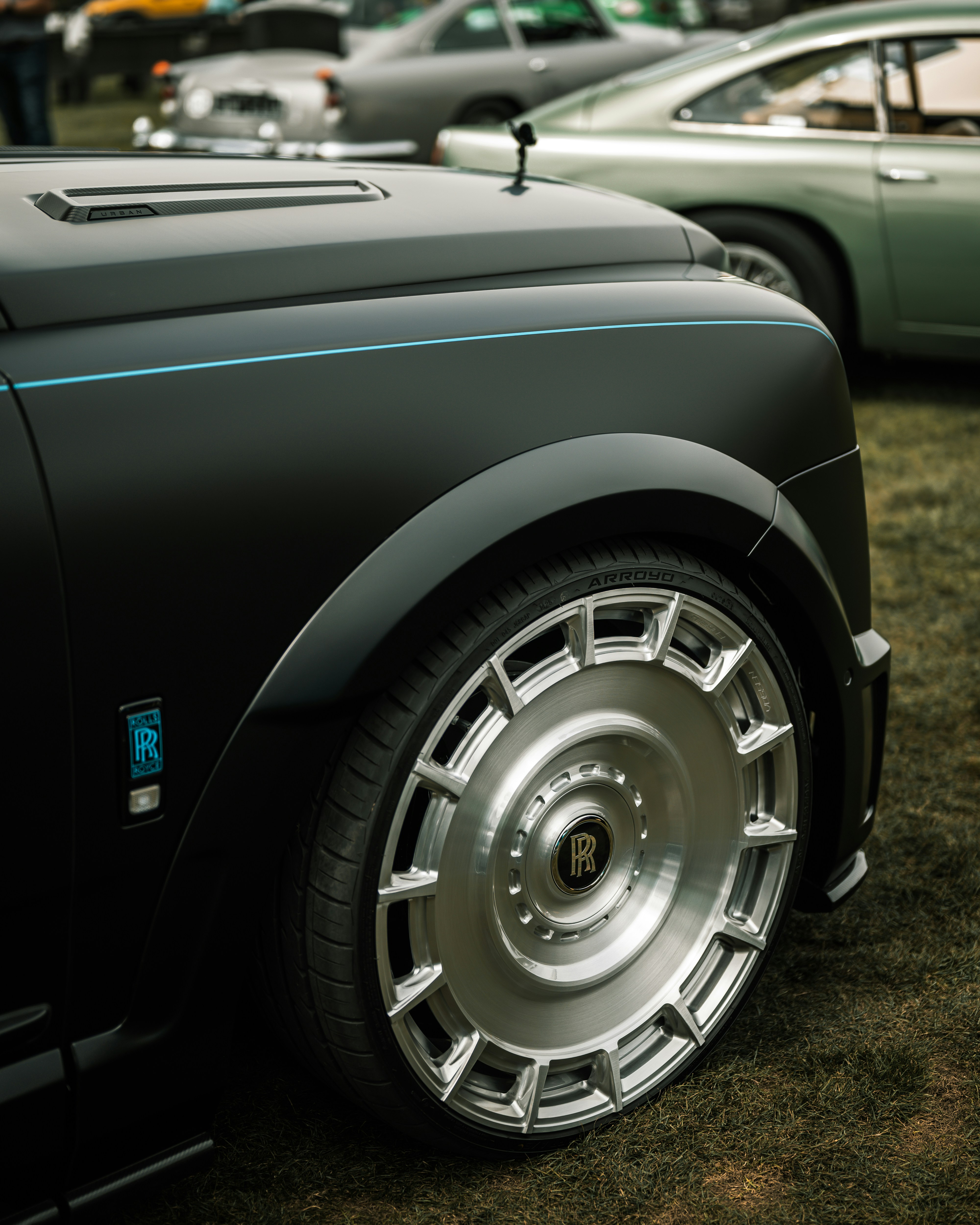 Low-Angle Detail: The Rolls-Royce Rim and Matte Black Body