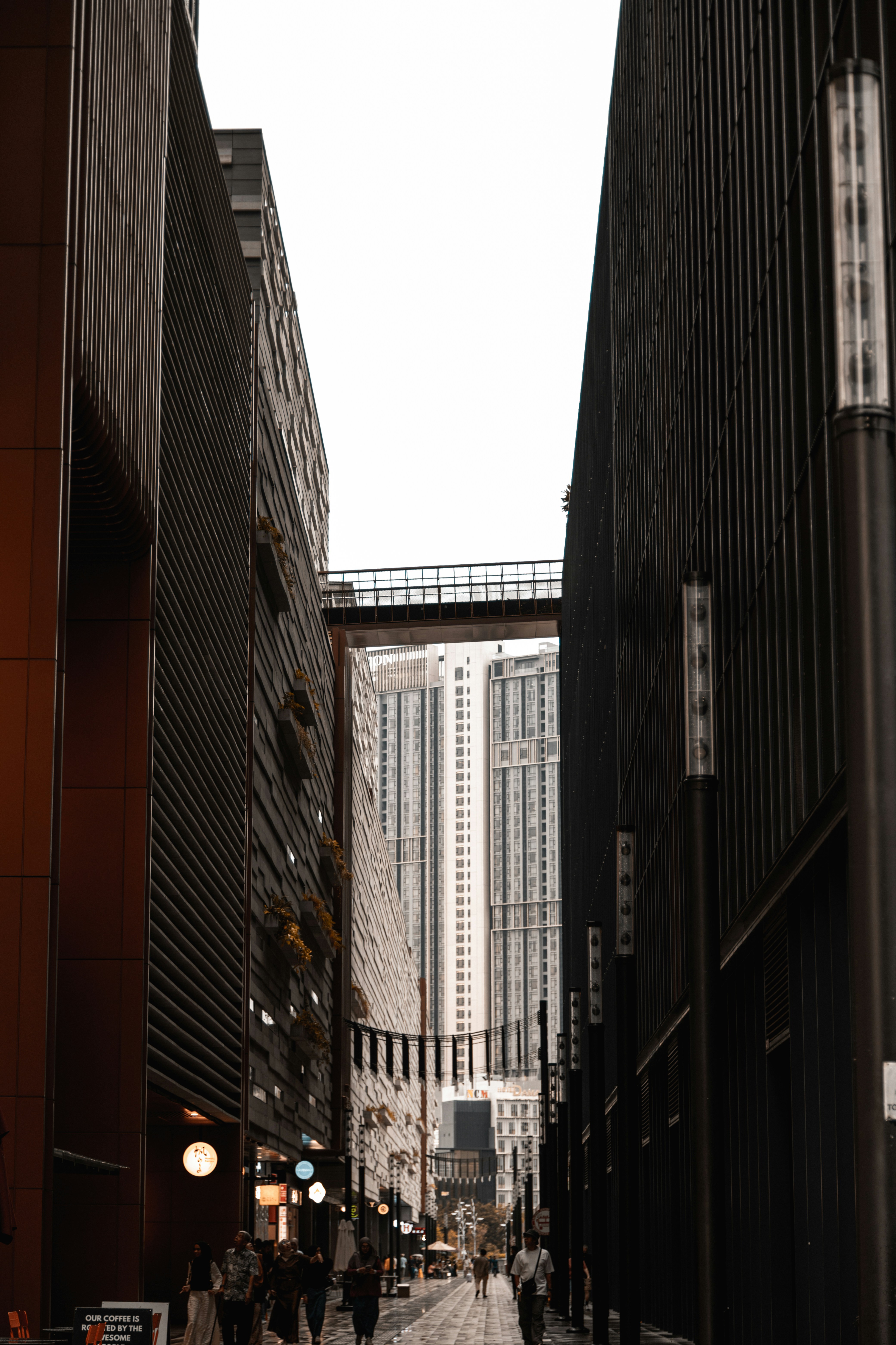 Modern buildings with a skybridge connecting them.