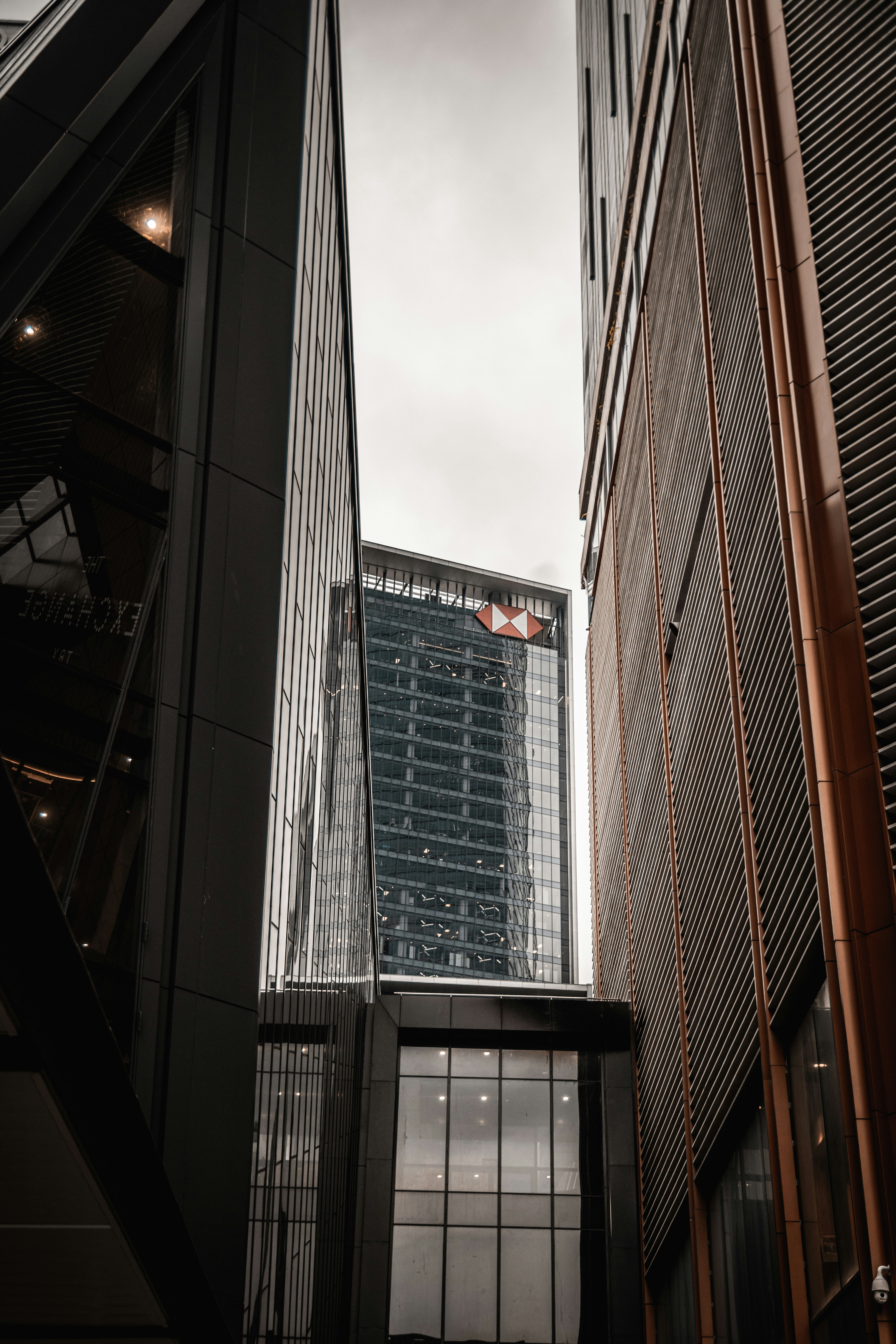 Modern skyscrapers viewed from below on an overcast day