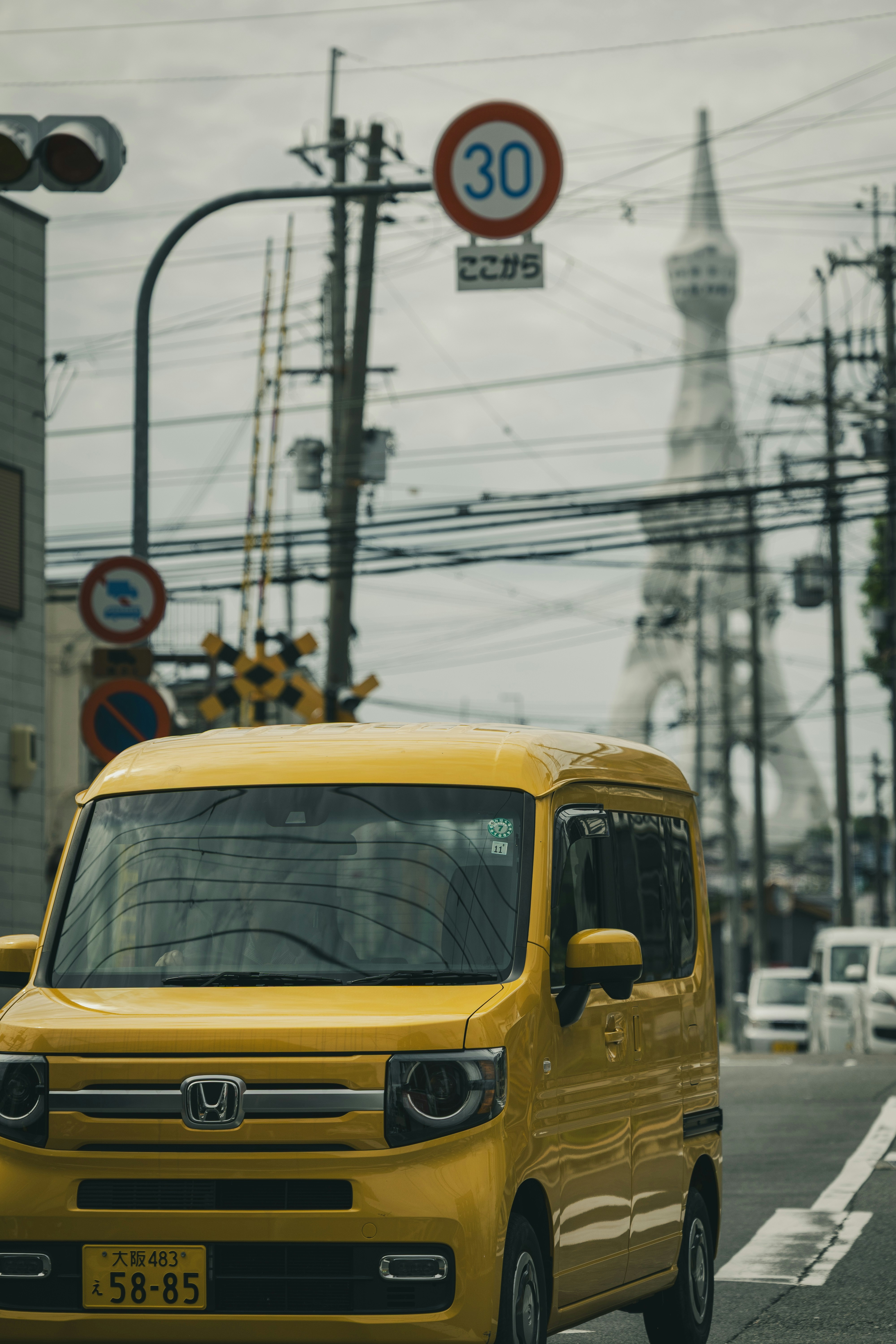Urban Harmony: A Yellow Beacon Amidst the Concrete Jungle