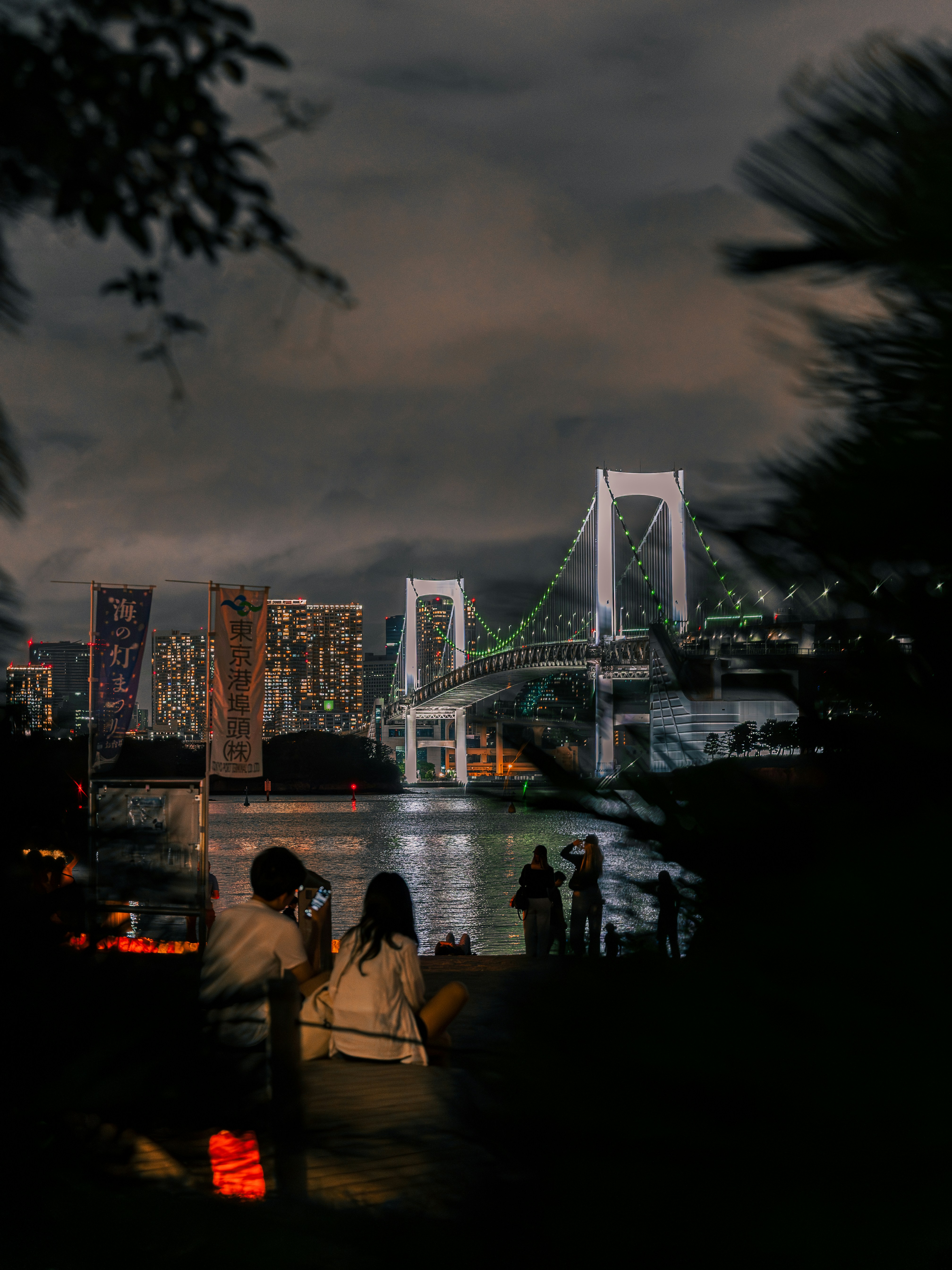 Neon Arches Over Water: Night on the Waterfront
