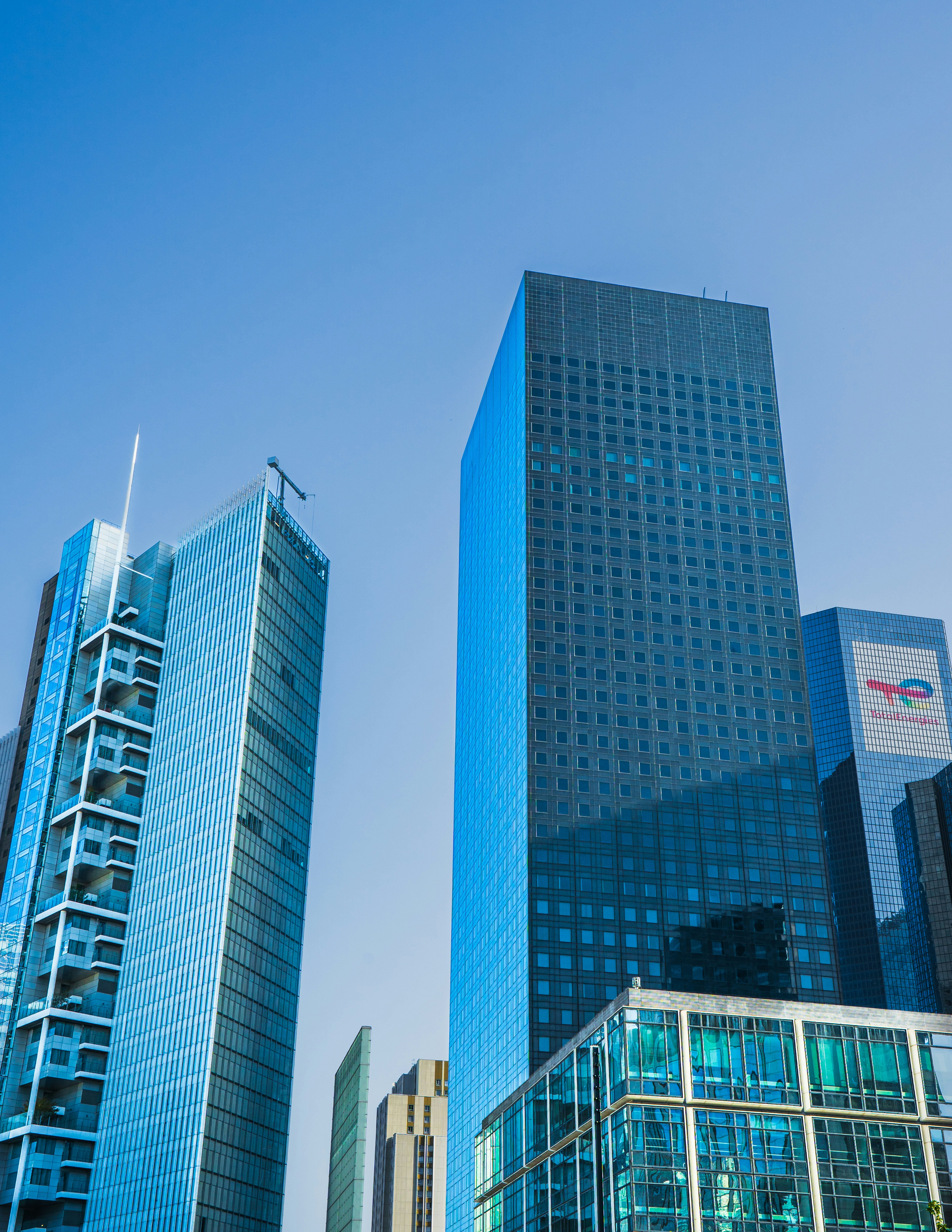 Modern skyscrapers against a clear blue sky