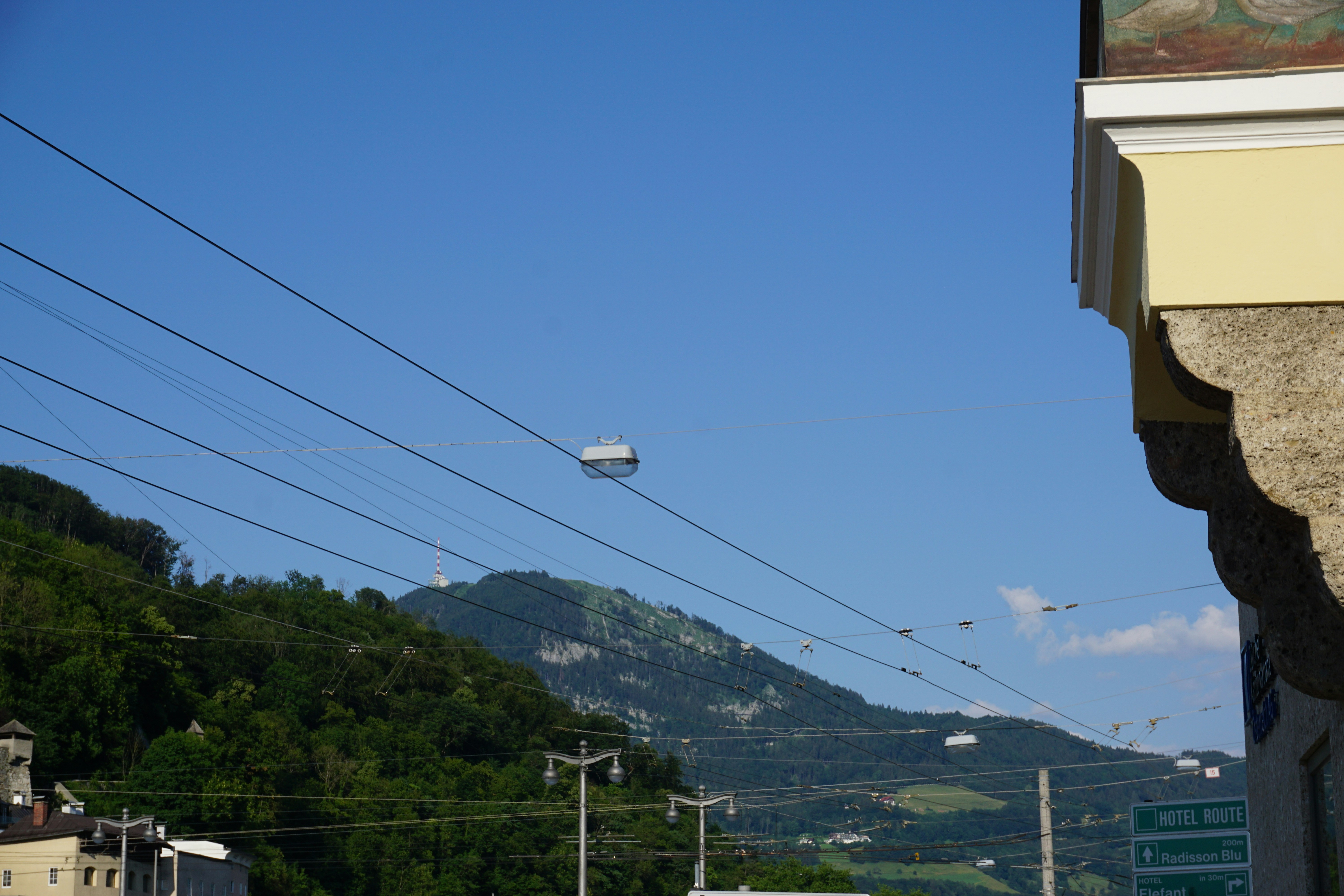 A Serene Mountain Escape: Cable Cars and Clear Skies
