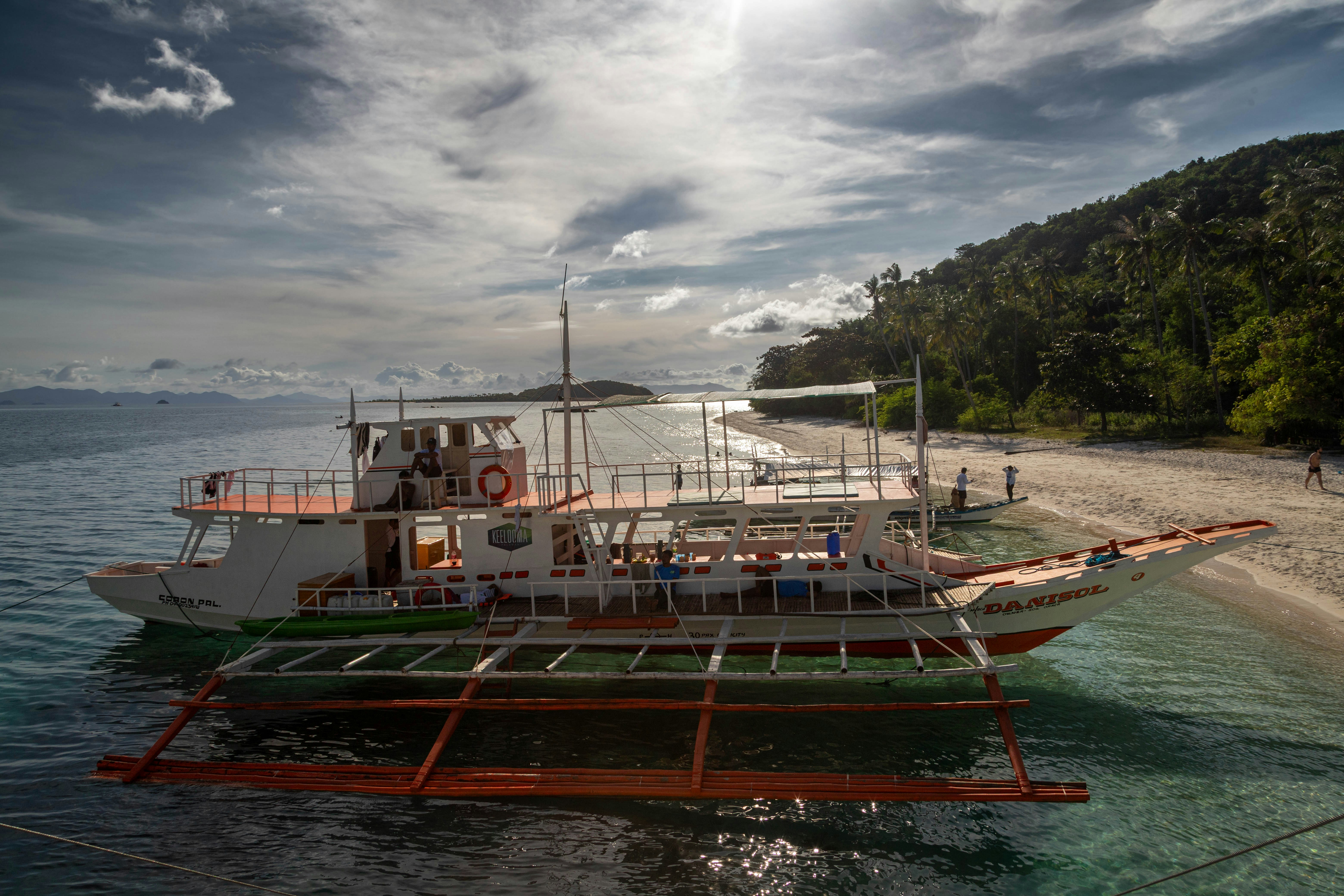 Serenity at the Shoreline: A Traditional Vessel Awaits