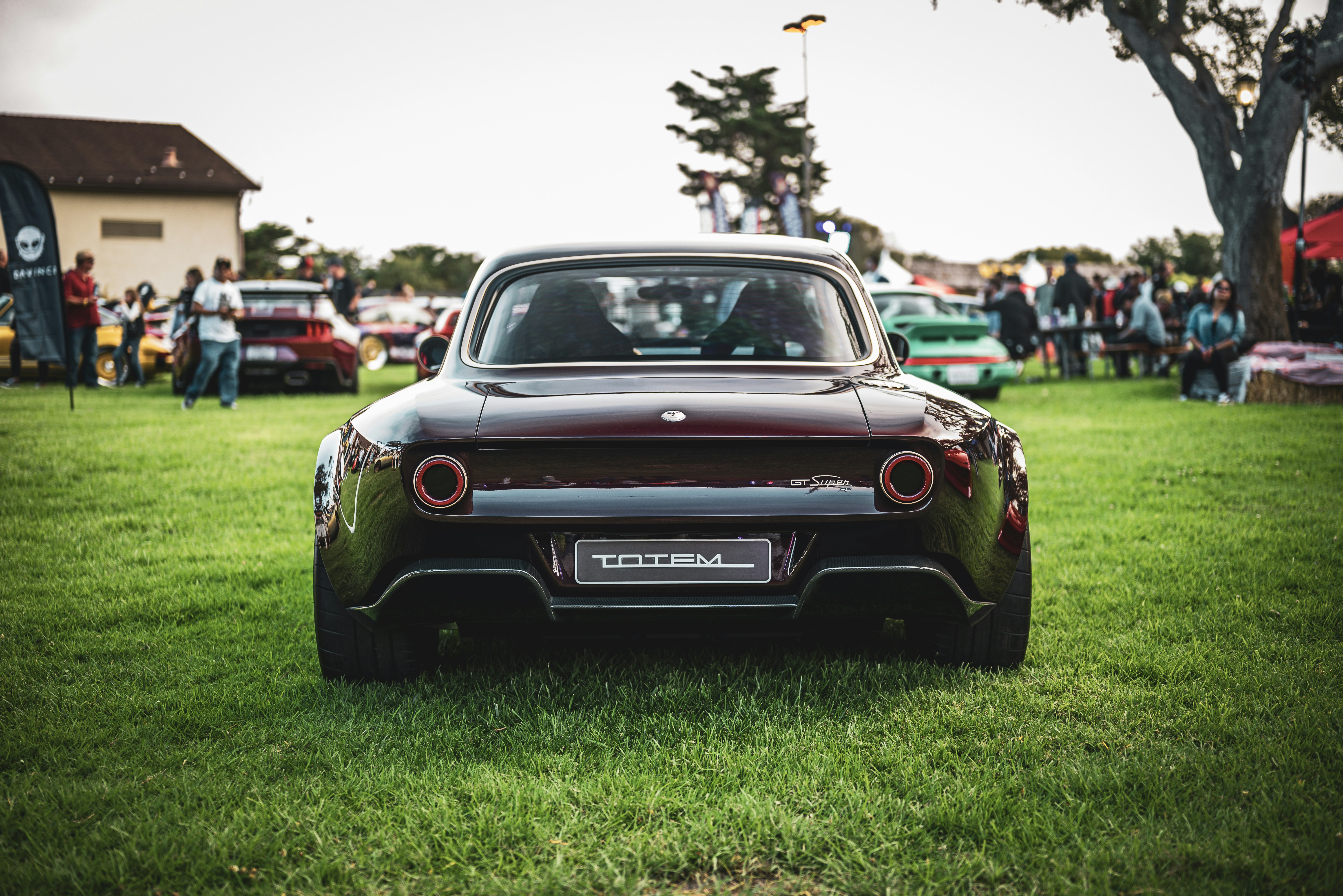 The Totem Automobili Super GT SP is a handcrafted Italian grand tourer powered by a 3.2L V6, captured at the Monterey Motorsports Festival 2025. It combines timeless design, modern performance, and exquisite carbon fiber craftsmanship.