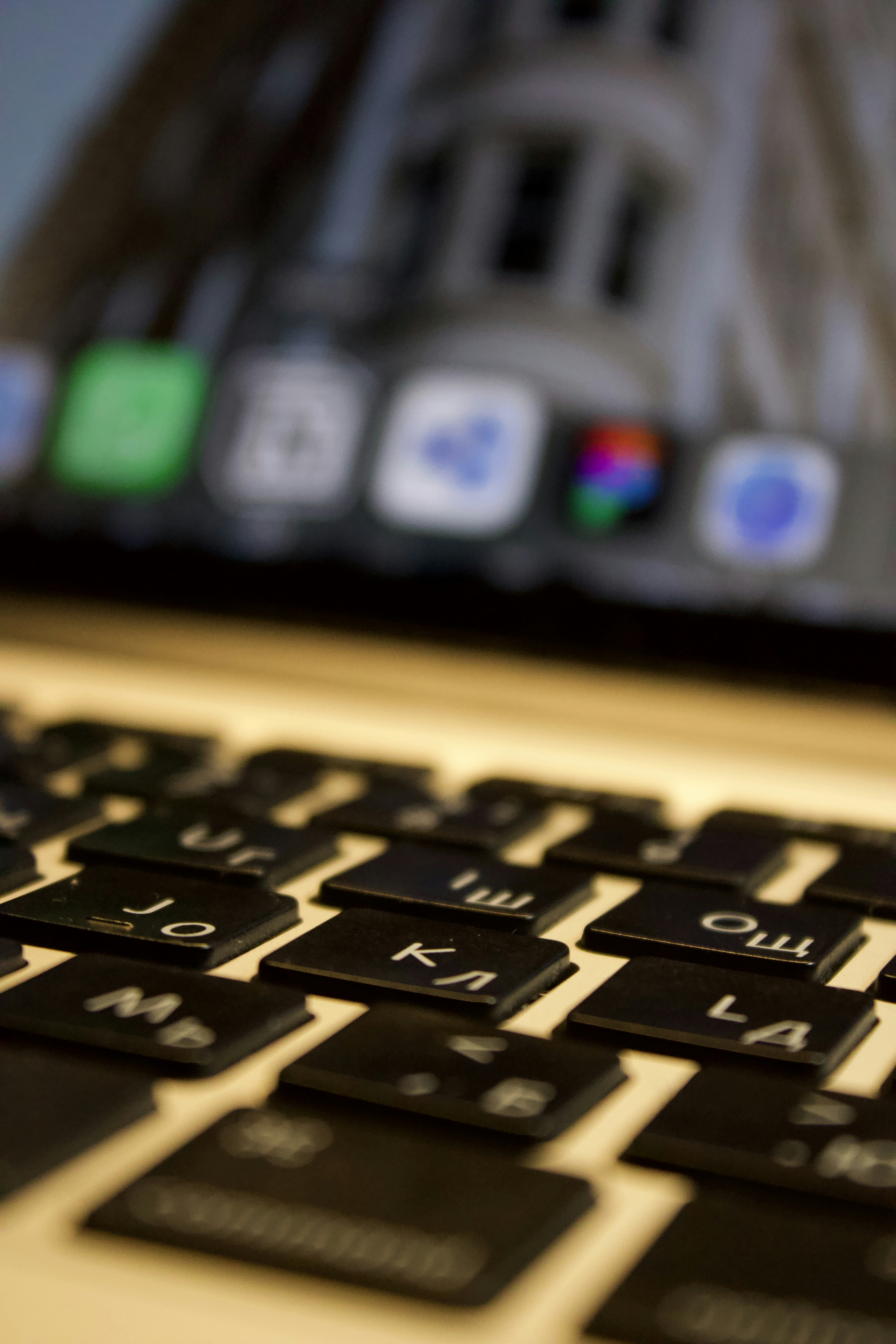 Close-up of a laptop keyboard with screen in background photo – Free ...