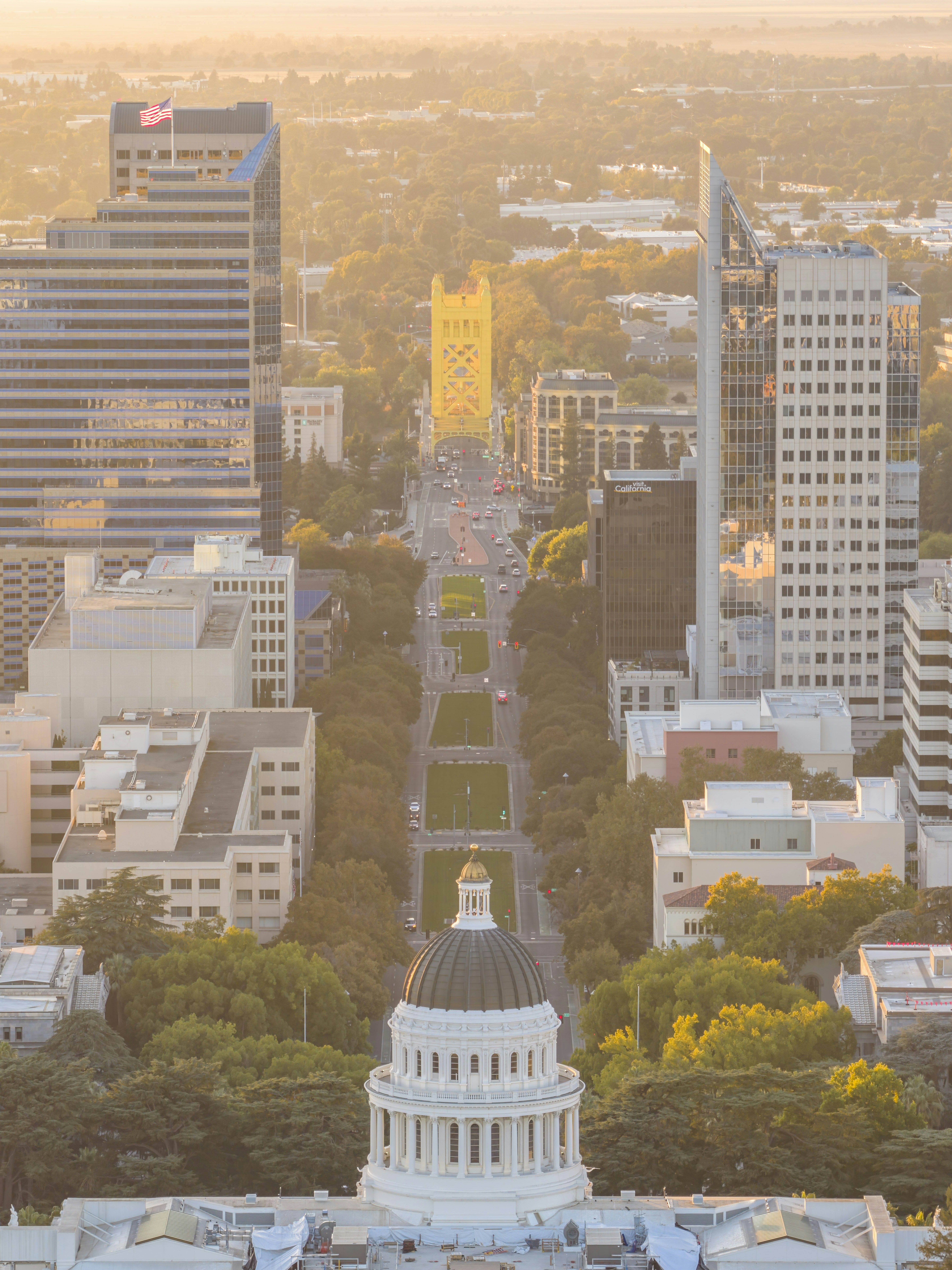 Cityscape with capitol building and skyscrapers at sunset