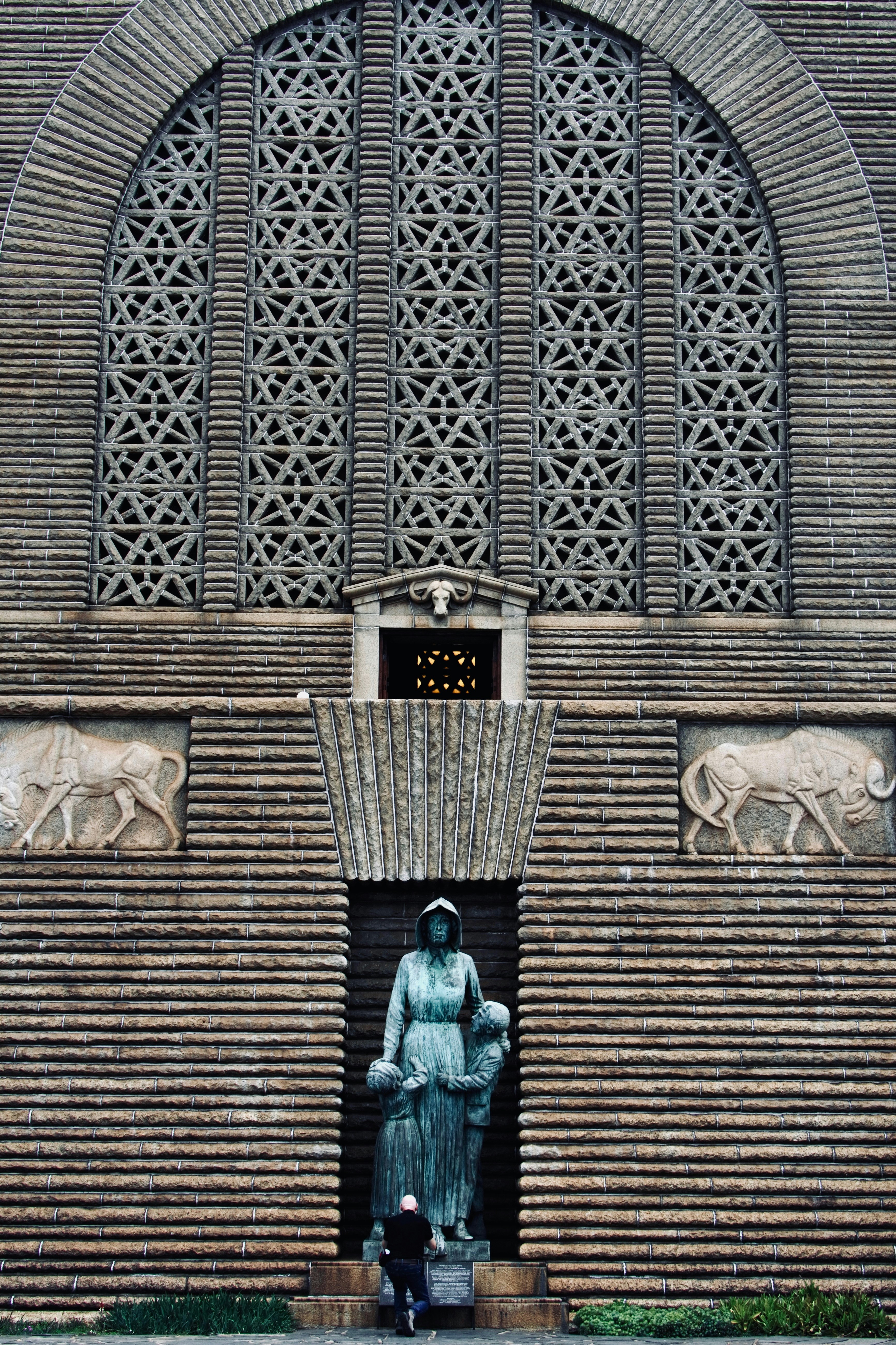 The Voortrekker Monument in Pretoria is built to commemorate the ancestors of the Boers (South Africans of Dutch descent) who, in 1838, escaped British jurisdiction and established their own independent country by driving ox-wagons far away from the Cape Peninsula. Voortrekker Monument, Pretoria, South Africa | Monument with statue and reliefs of oxen