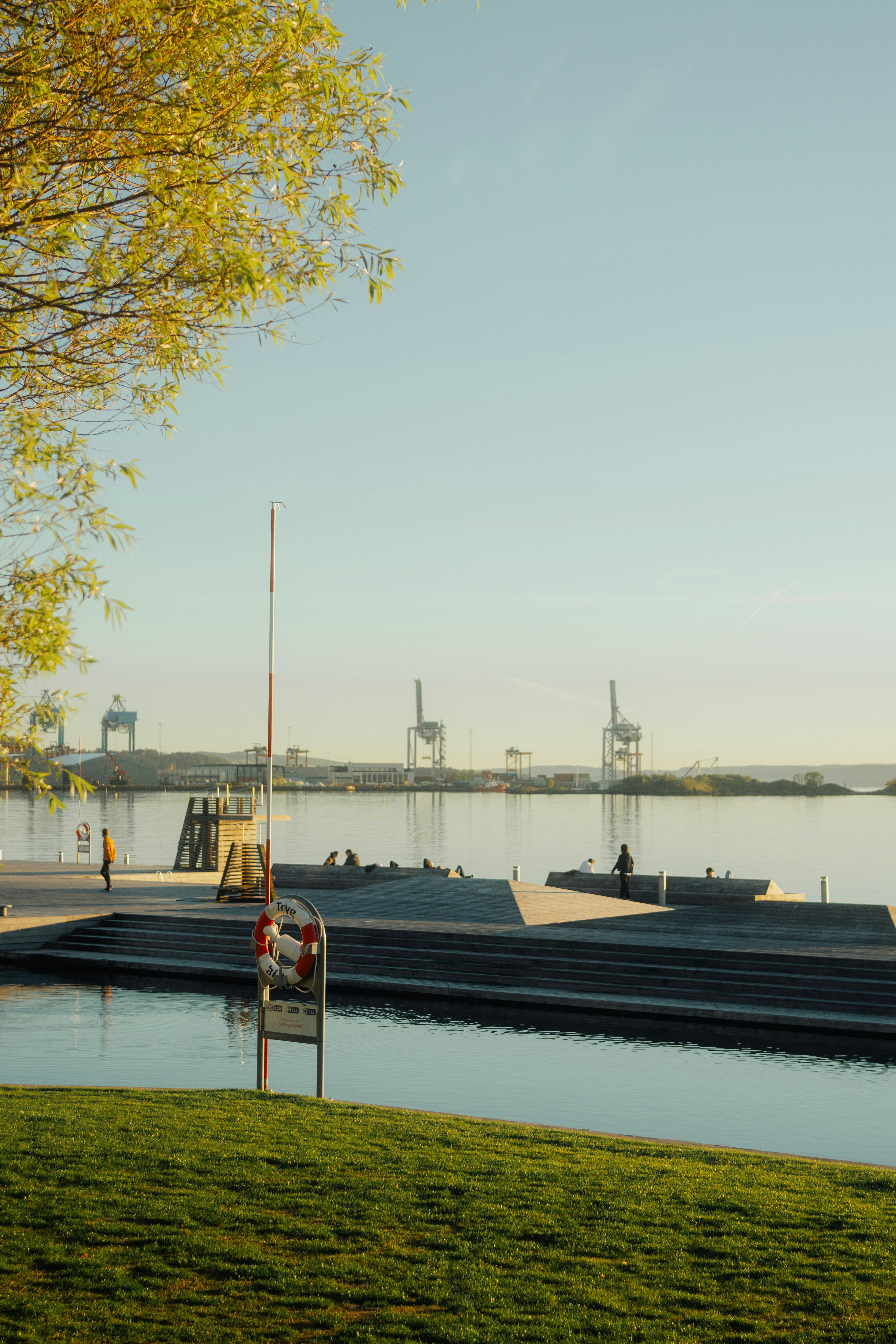 Lifebuoy at the Edge: Golden Hour by the Waterfront