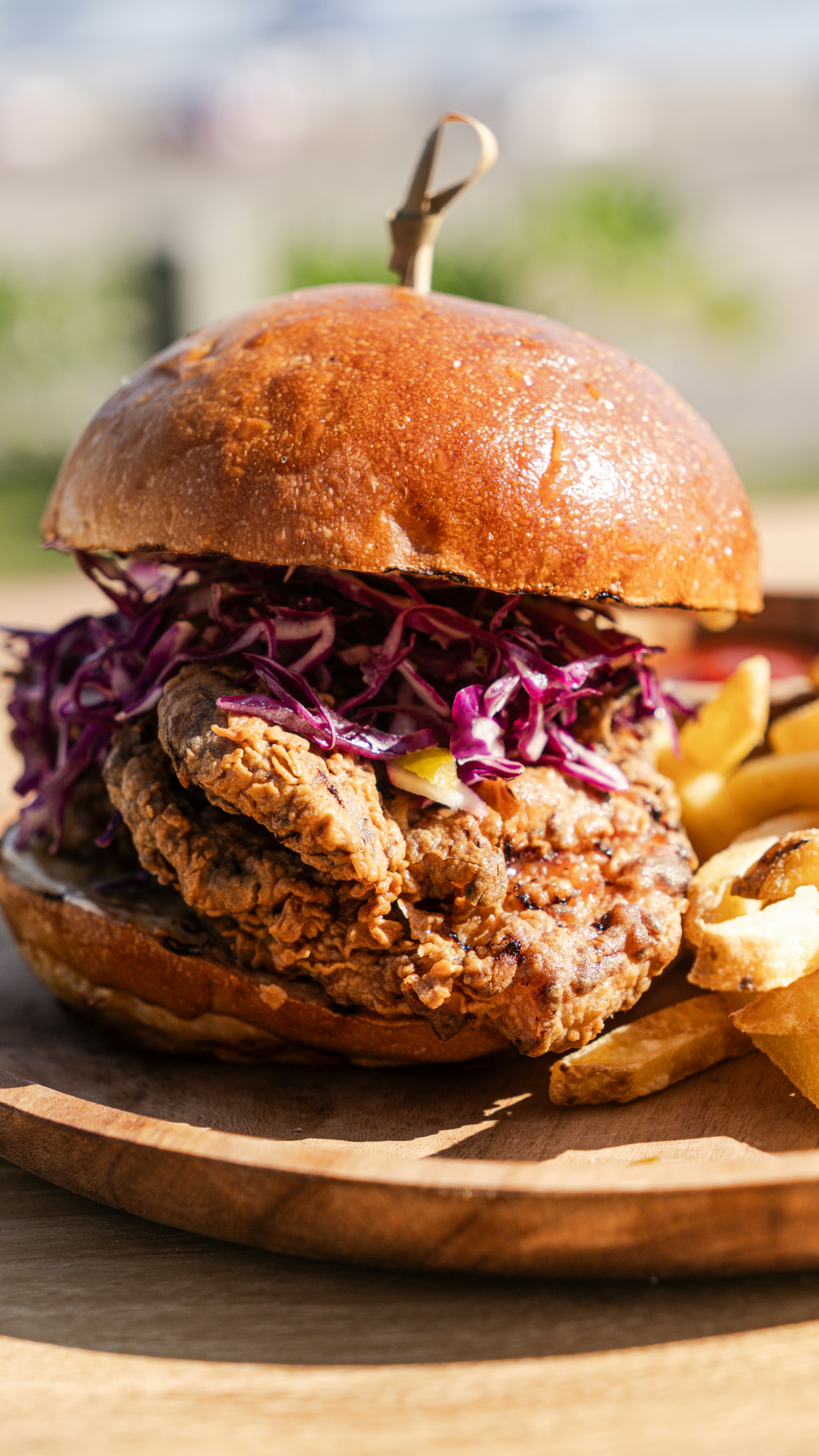 Fried chicken sandwich with coleslaw and fries