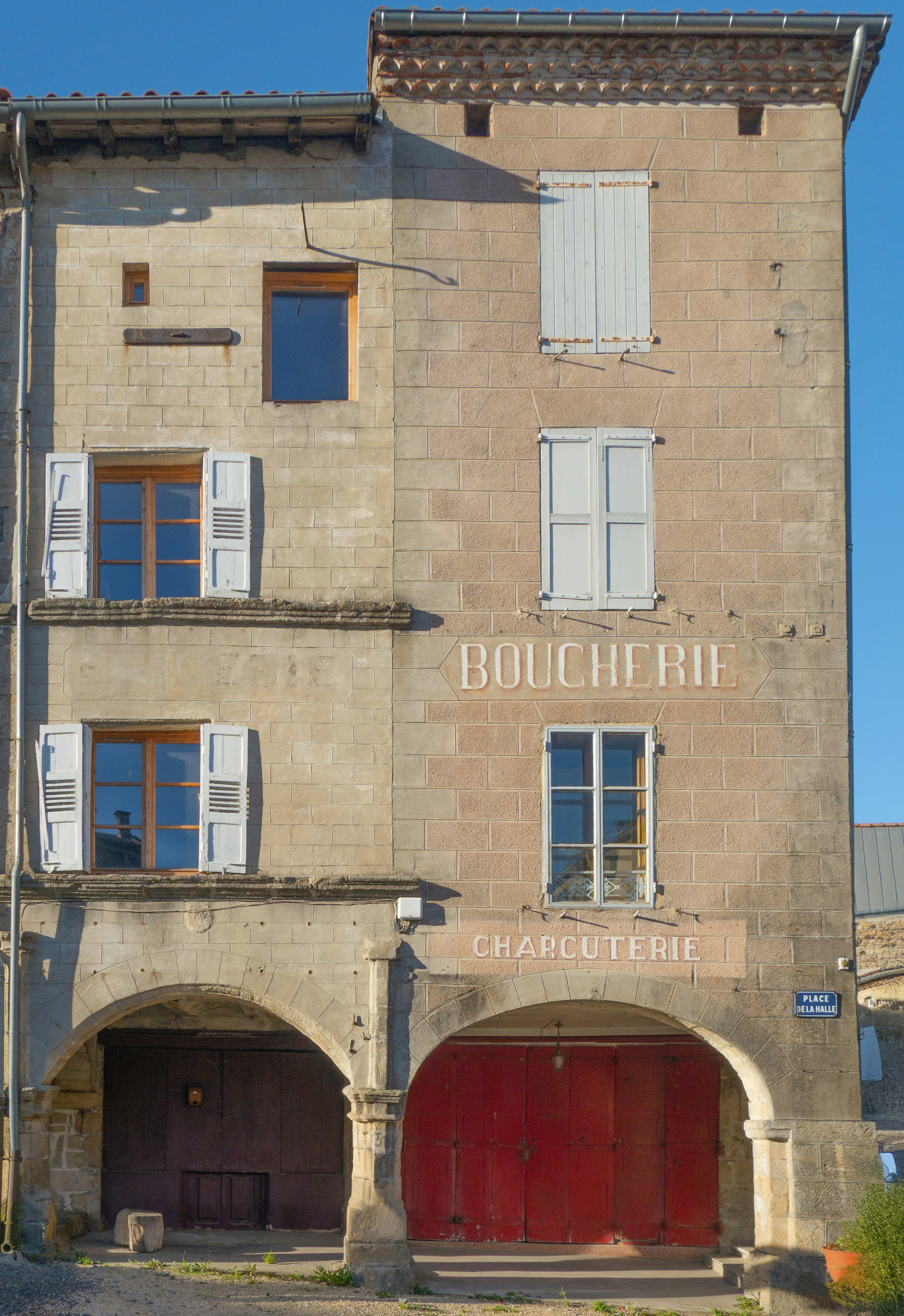 Old building with arches and shutters