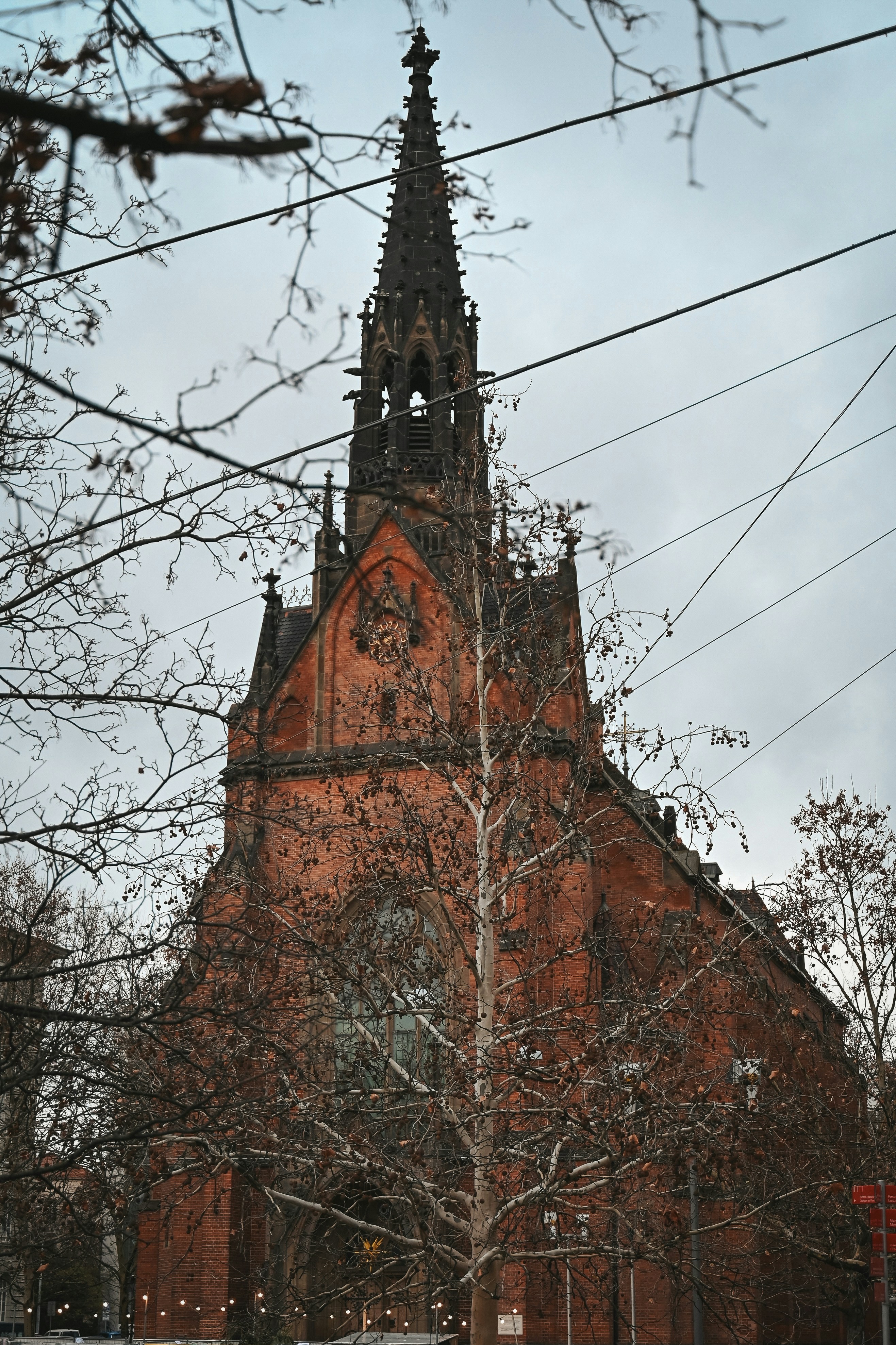 Gothic Spire Amidst Urban Nature