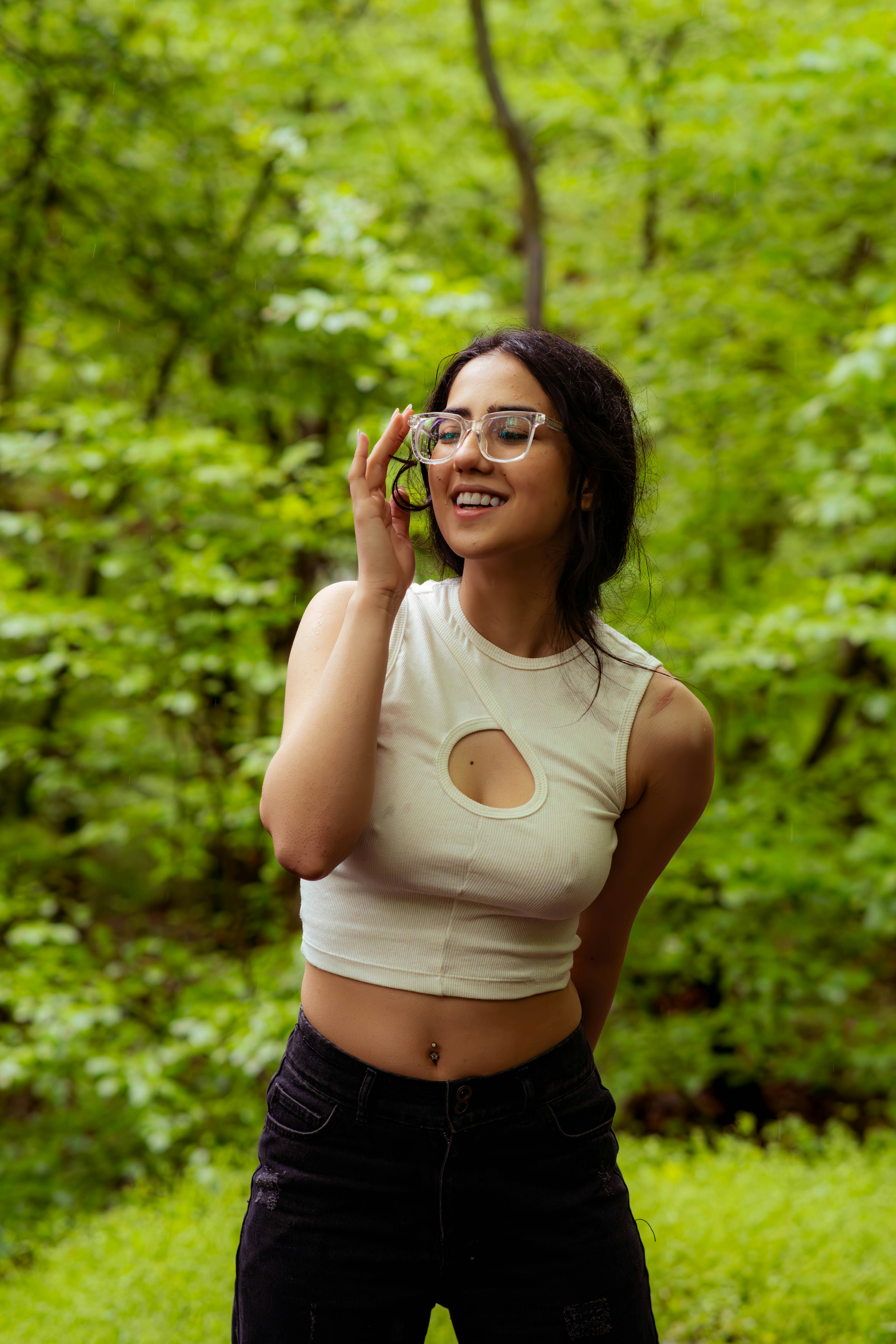 Canopy Smile: Confidence Framed by Verdant Light