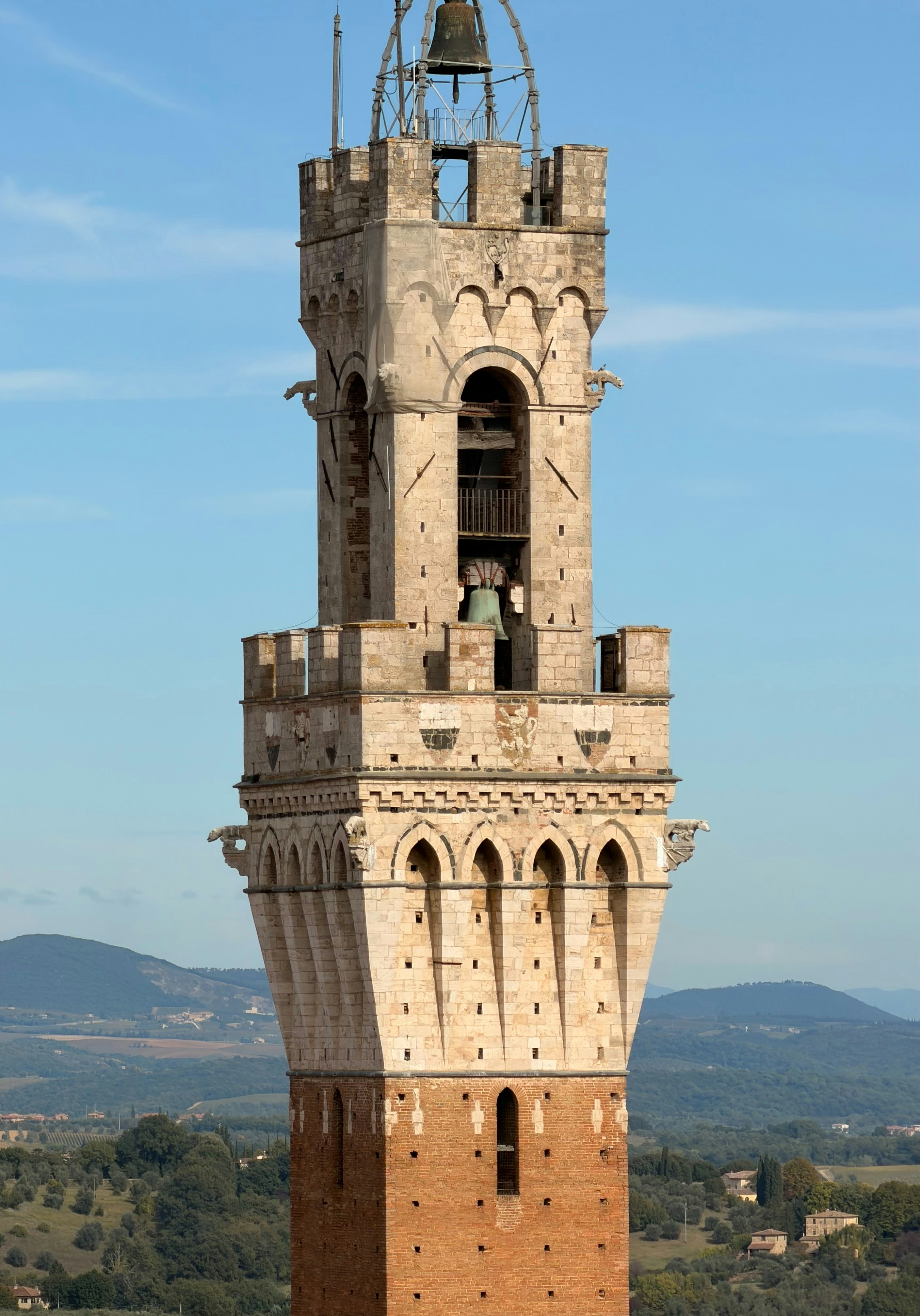 Belfry Ascending: A Brick Tower Framed by a Cerulean Sky