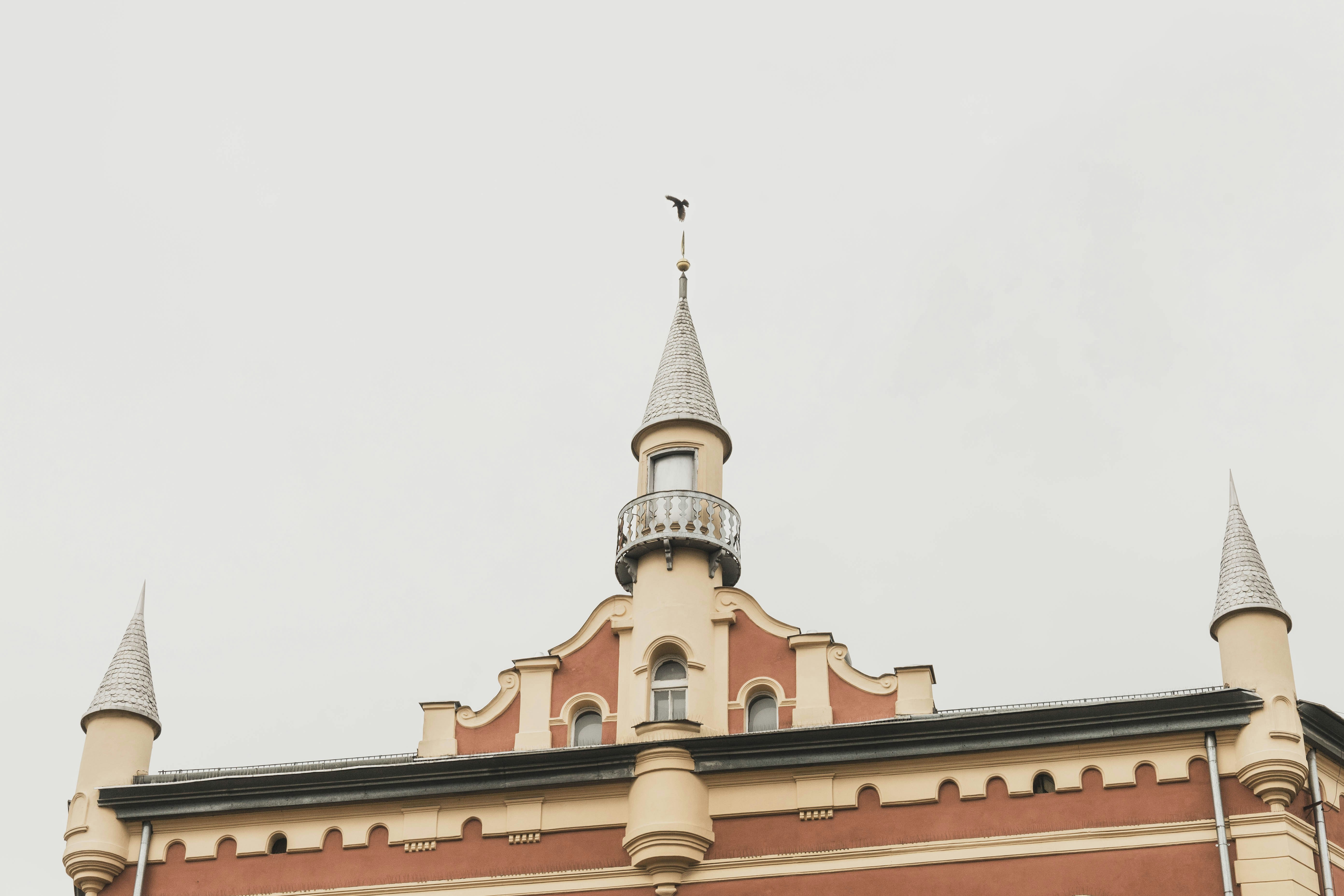 Ornate building facade with spires against sky