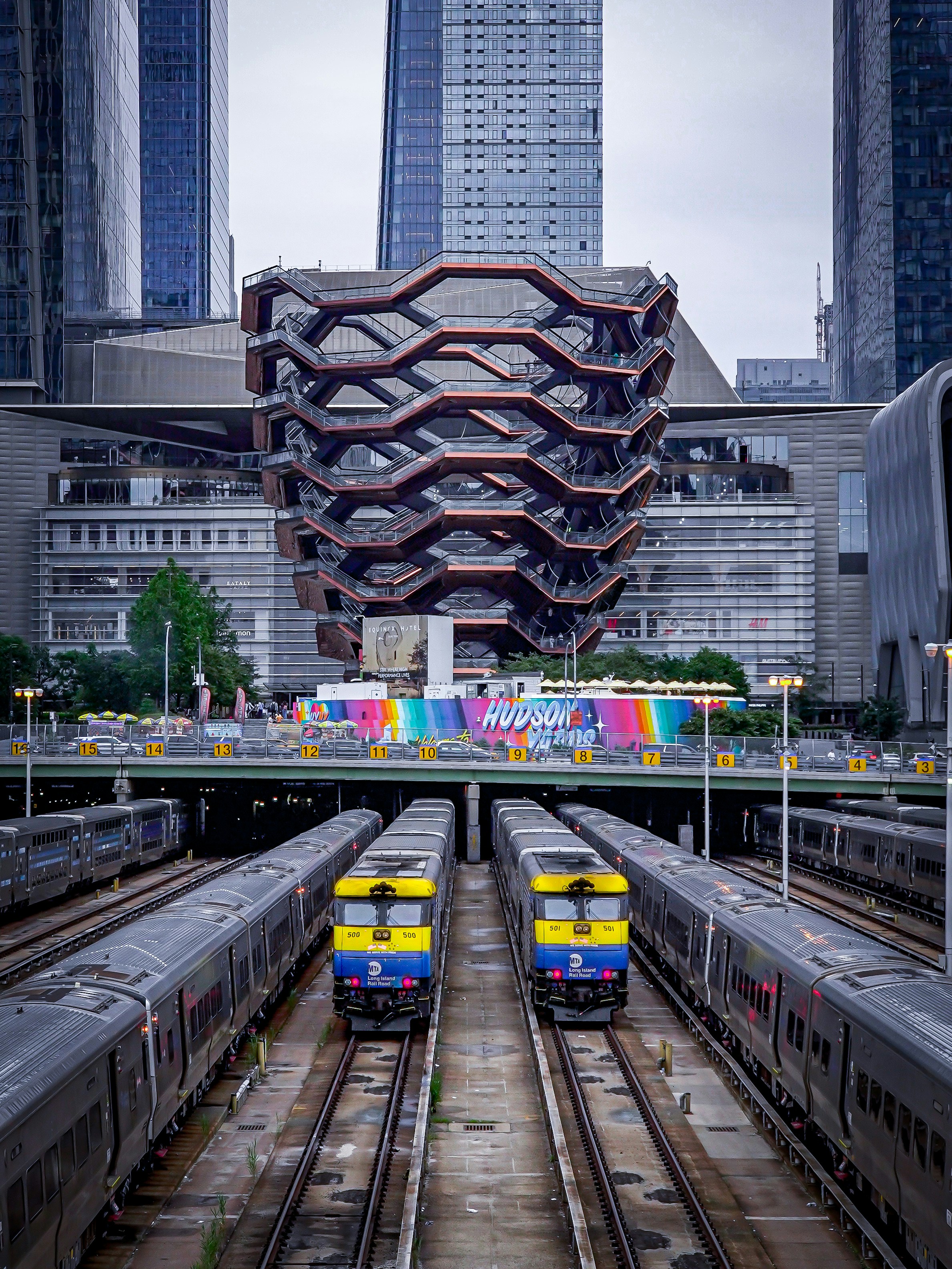 Trains at a station with modern architecture behind photo – Free ...