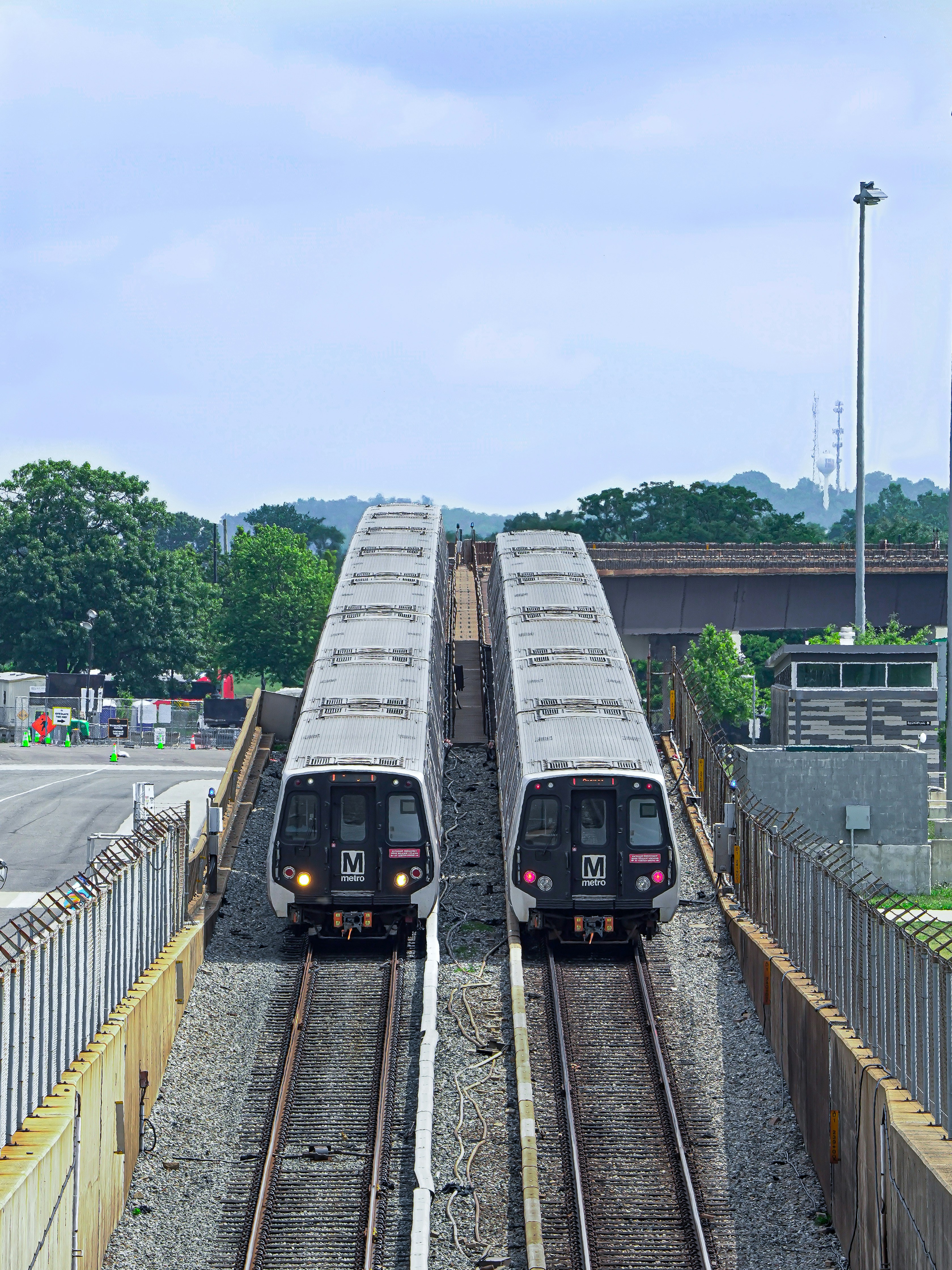 Two trains on parallel tracks approaching each other. photo – Free ...