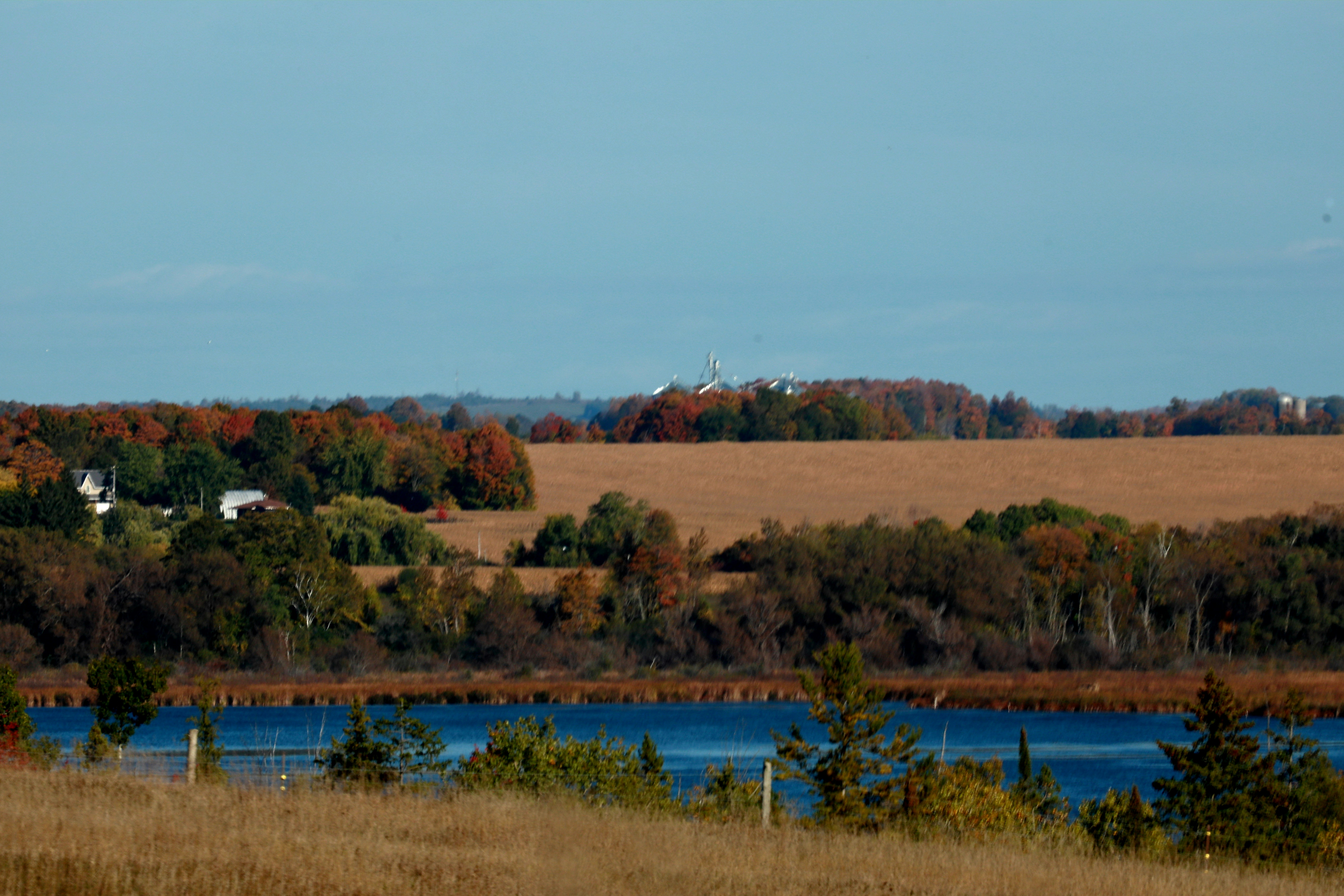 Autumn's Embrace Over Tranquil Waters