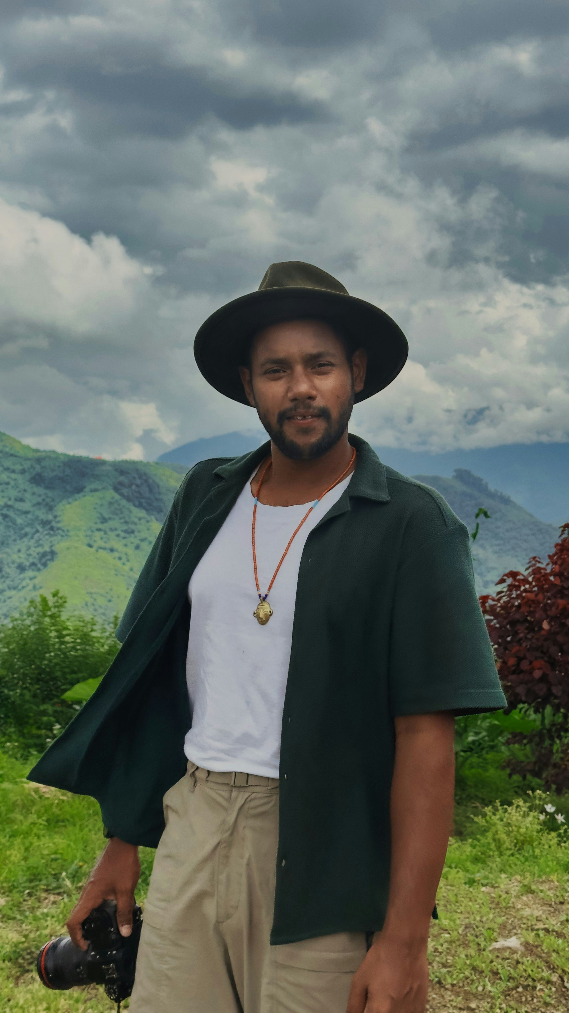 The Mountain Explorer: A Portrait Amidst Nature's Canvas