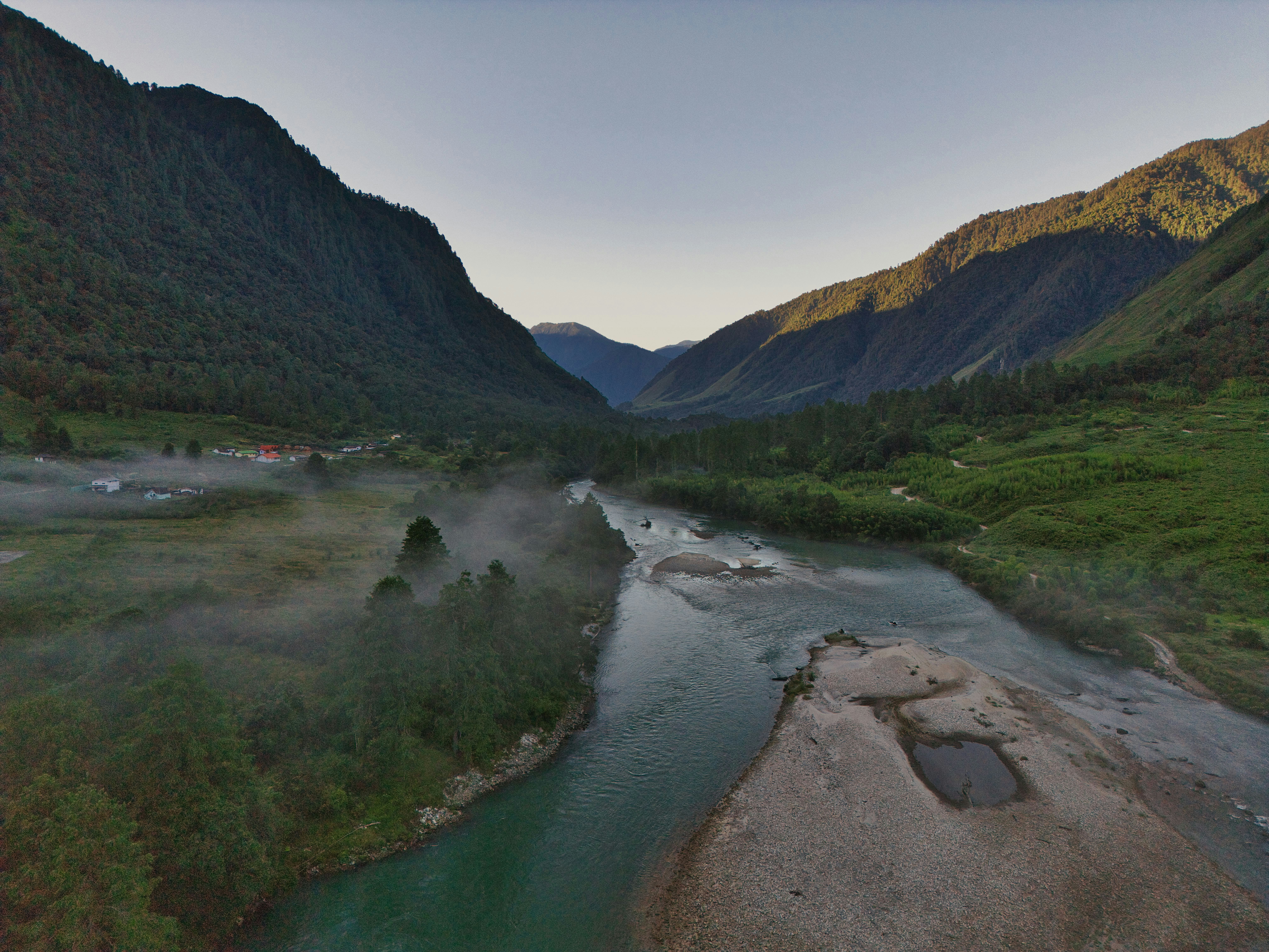 Whispers of the Valley: A Serene River Journey