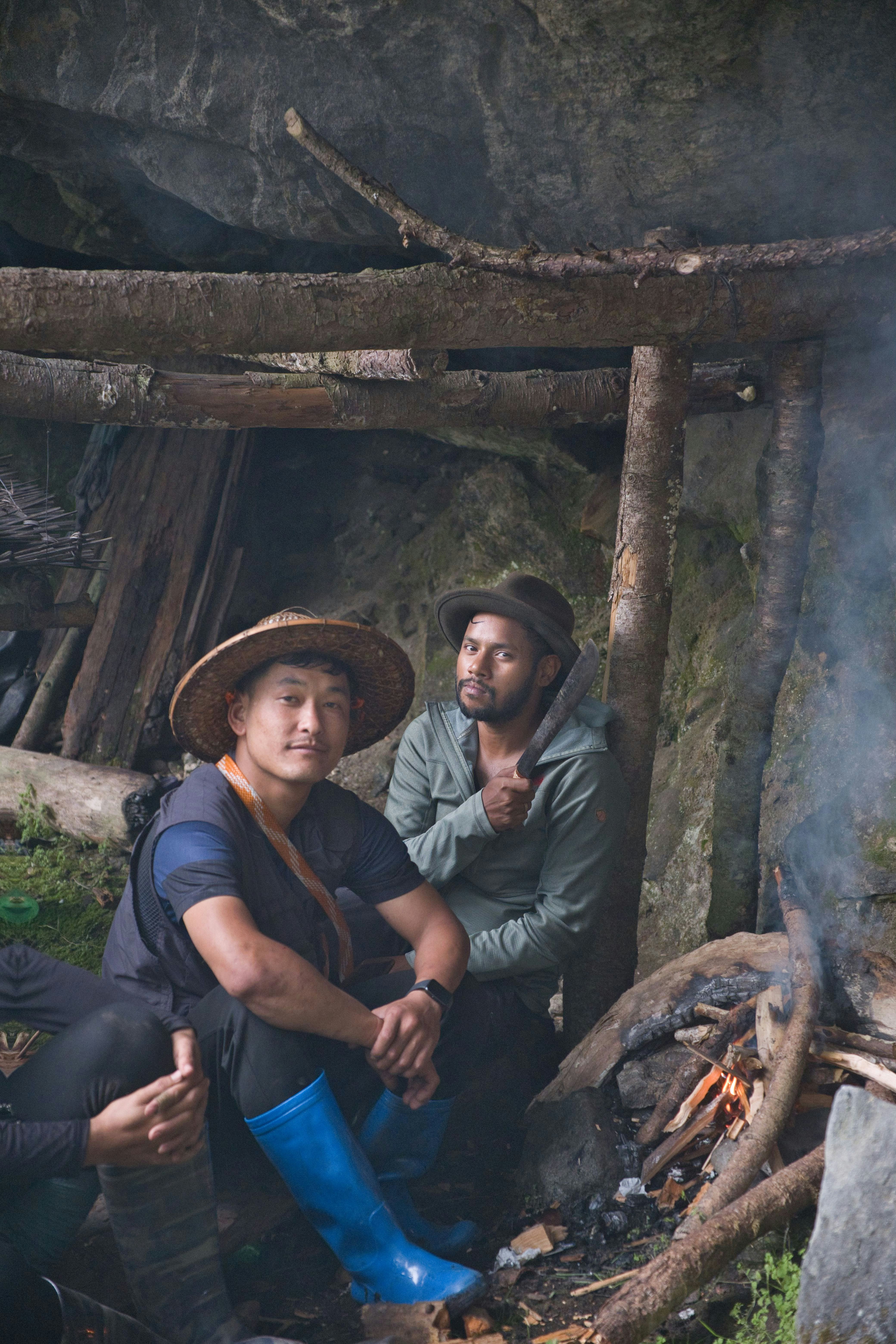 Haven by the Firelight: Companions in a Rustic Shelter