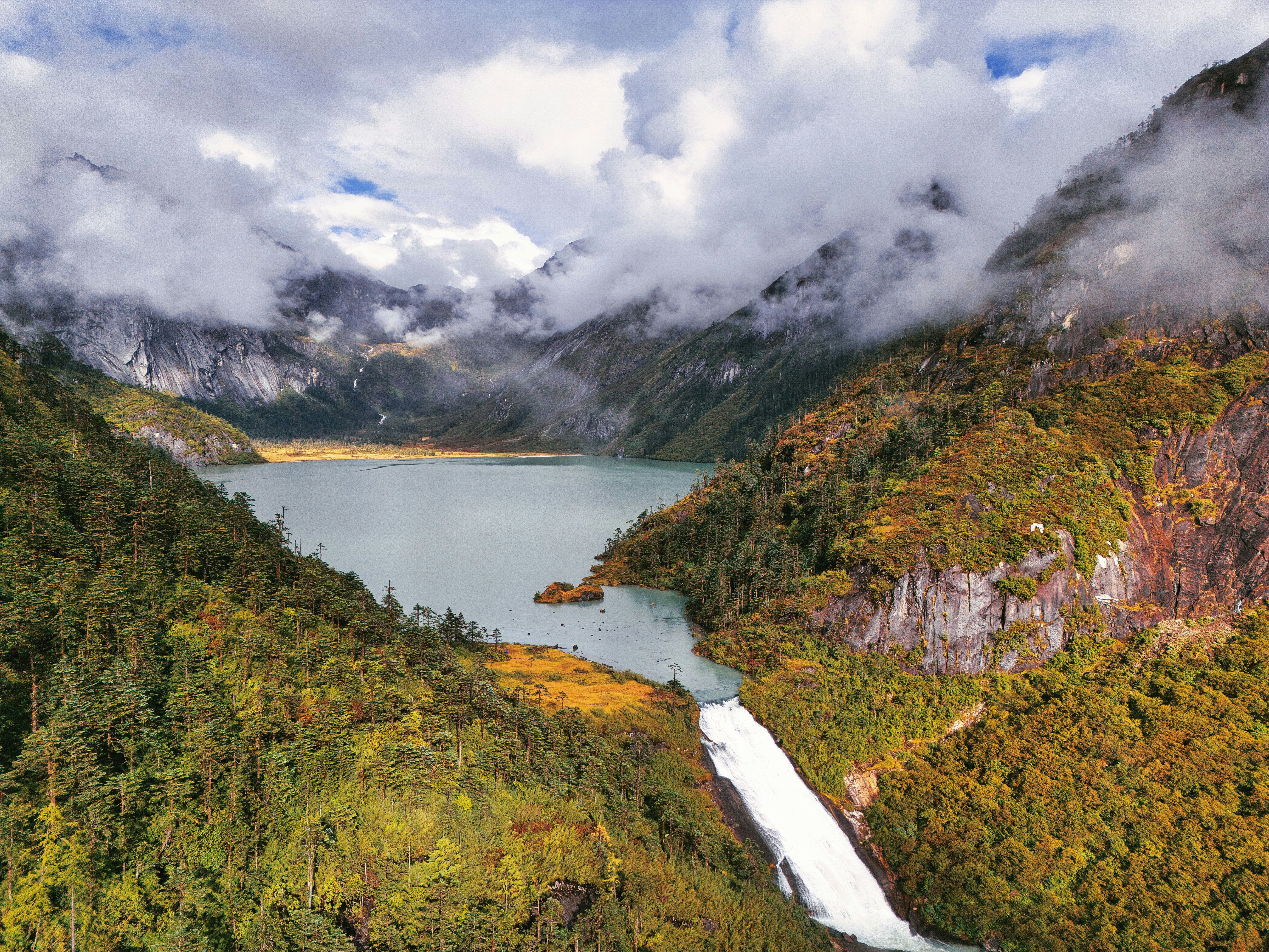 Emerald Waters Embraced by Majestic Peaks