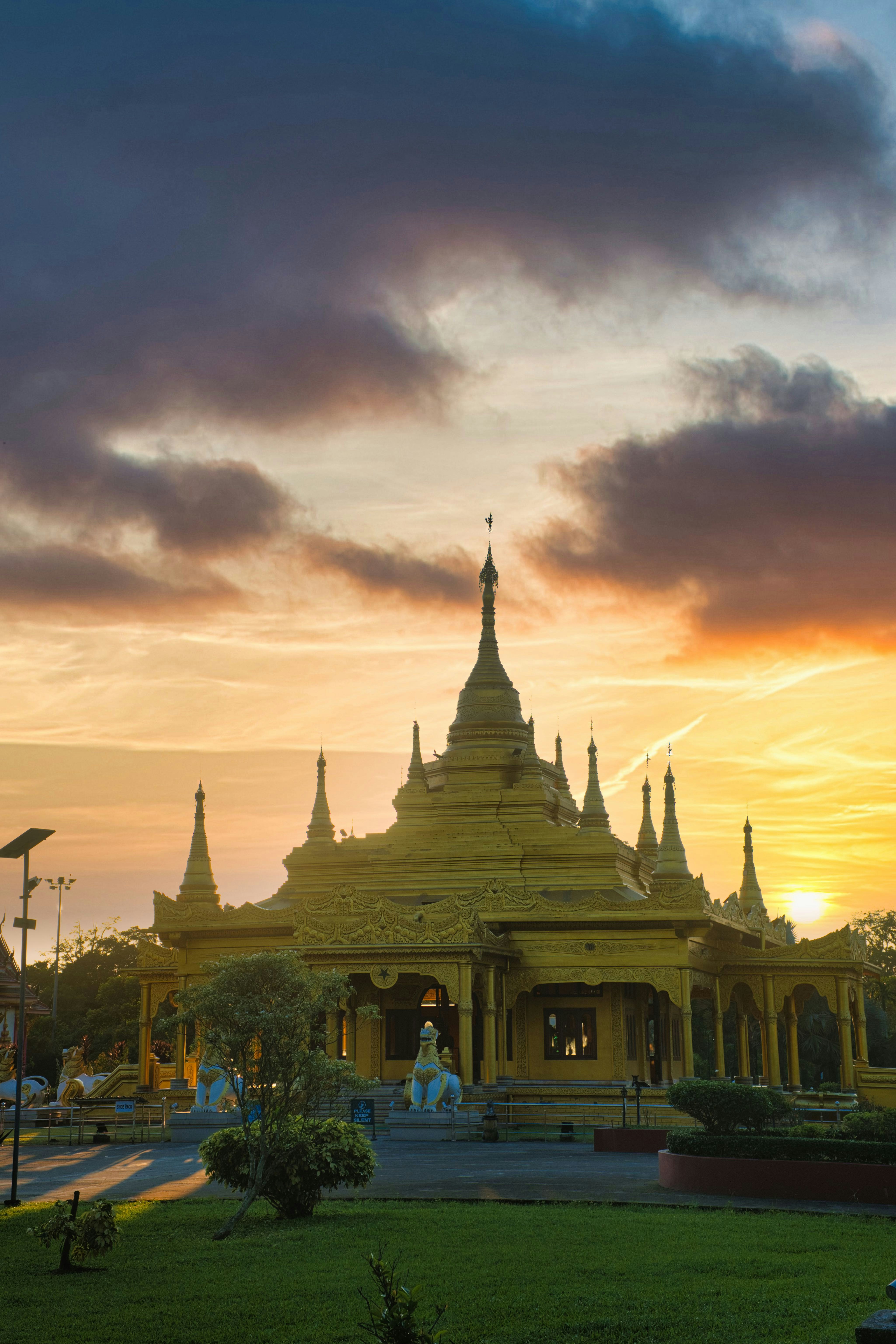 Golden temple illuminated by sunset light