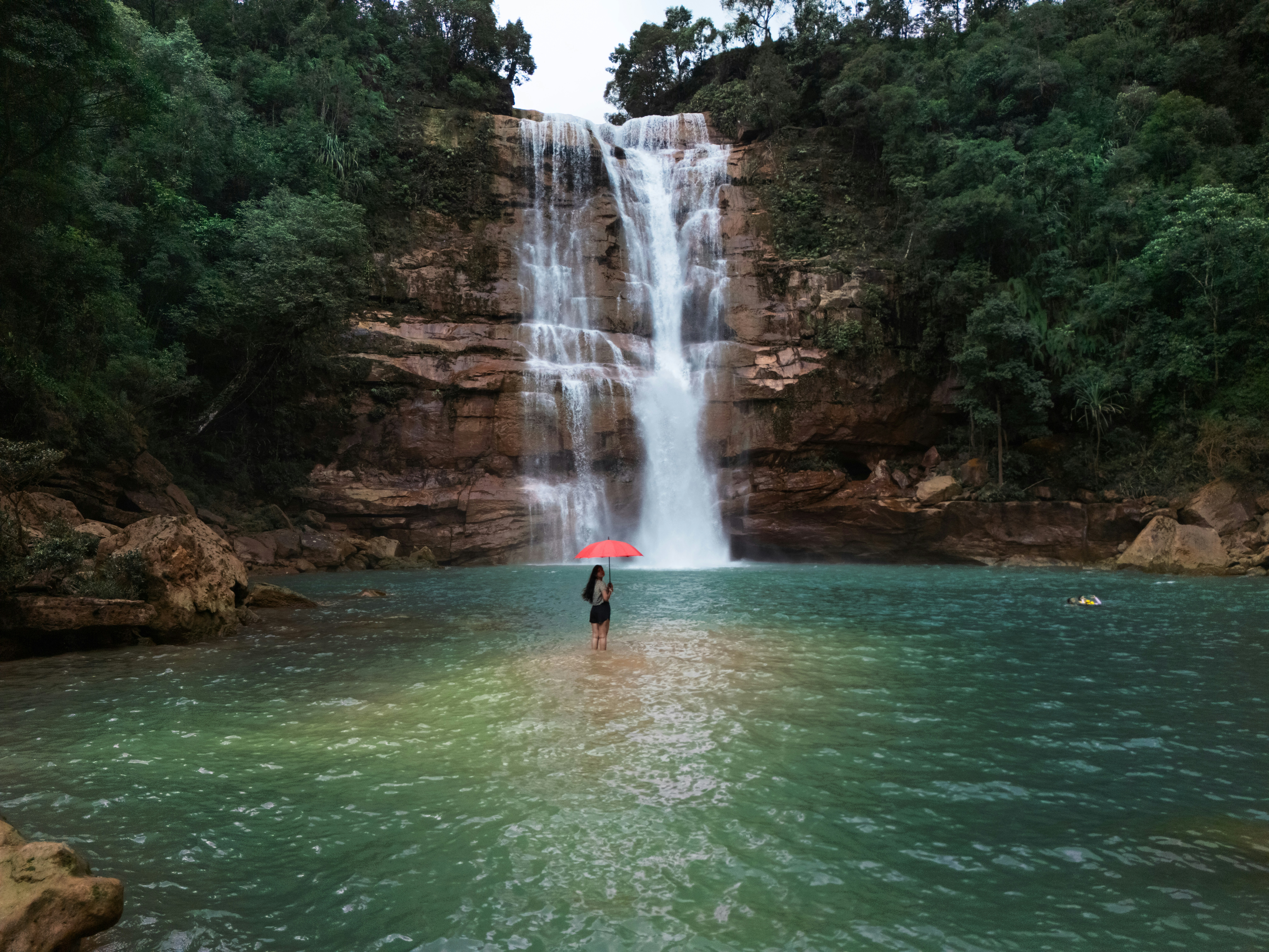 Embrace of Nature: A Serene Waterfall Retreat