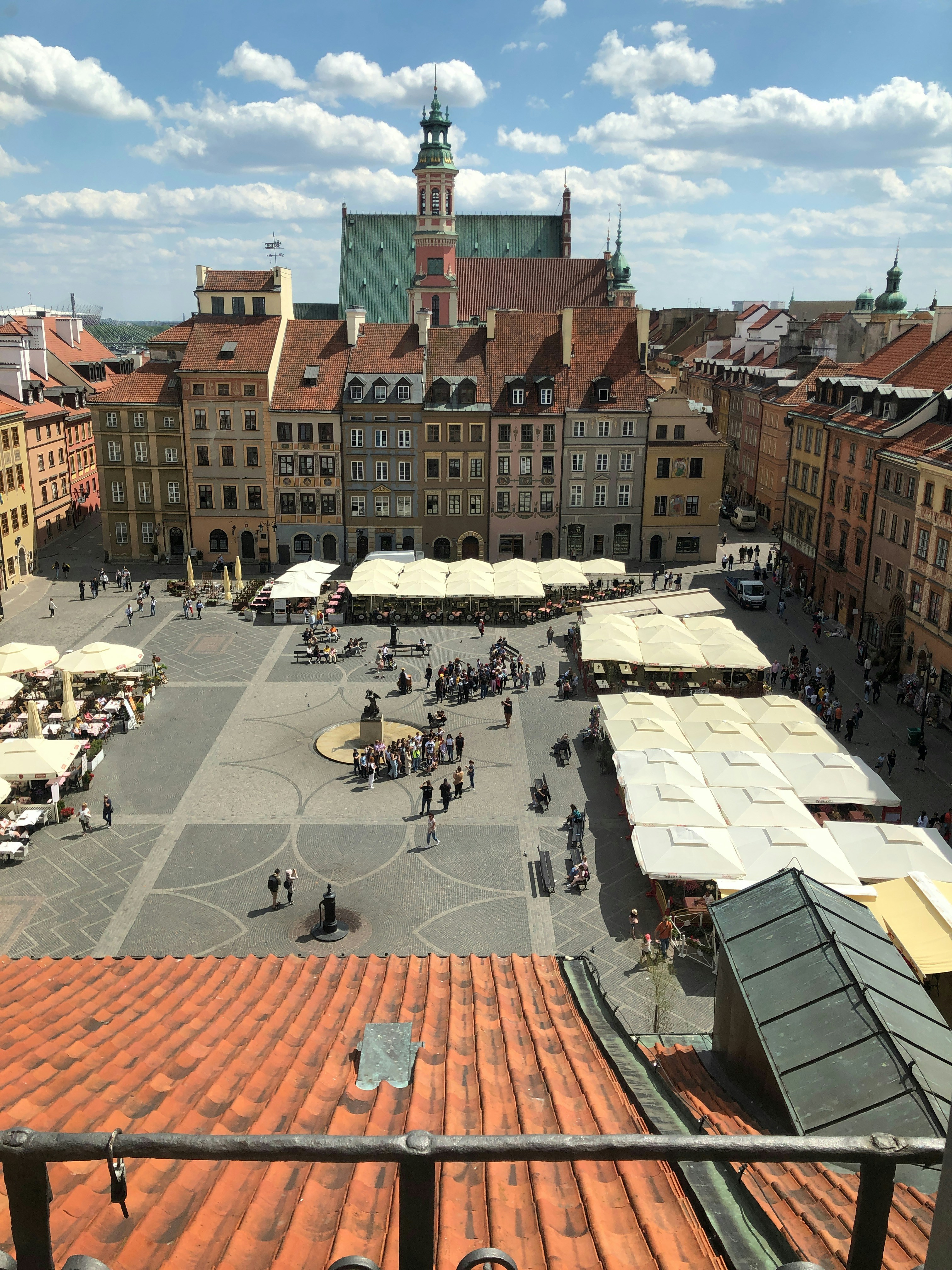 View from the top. May 22 | Busy european market square with outdoor cafes