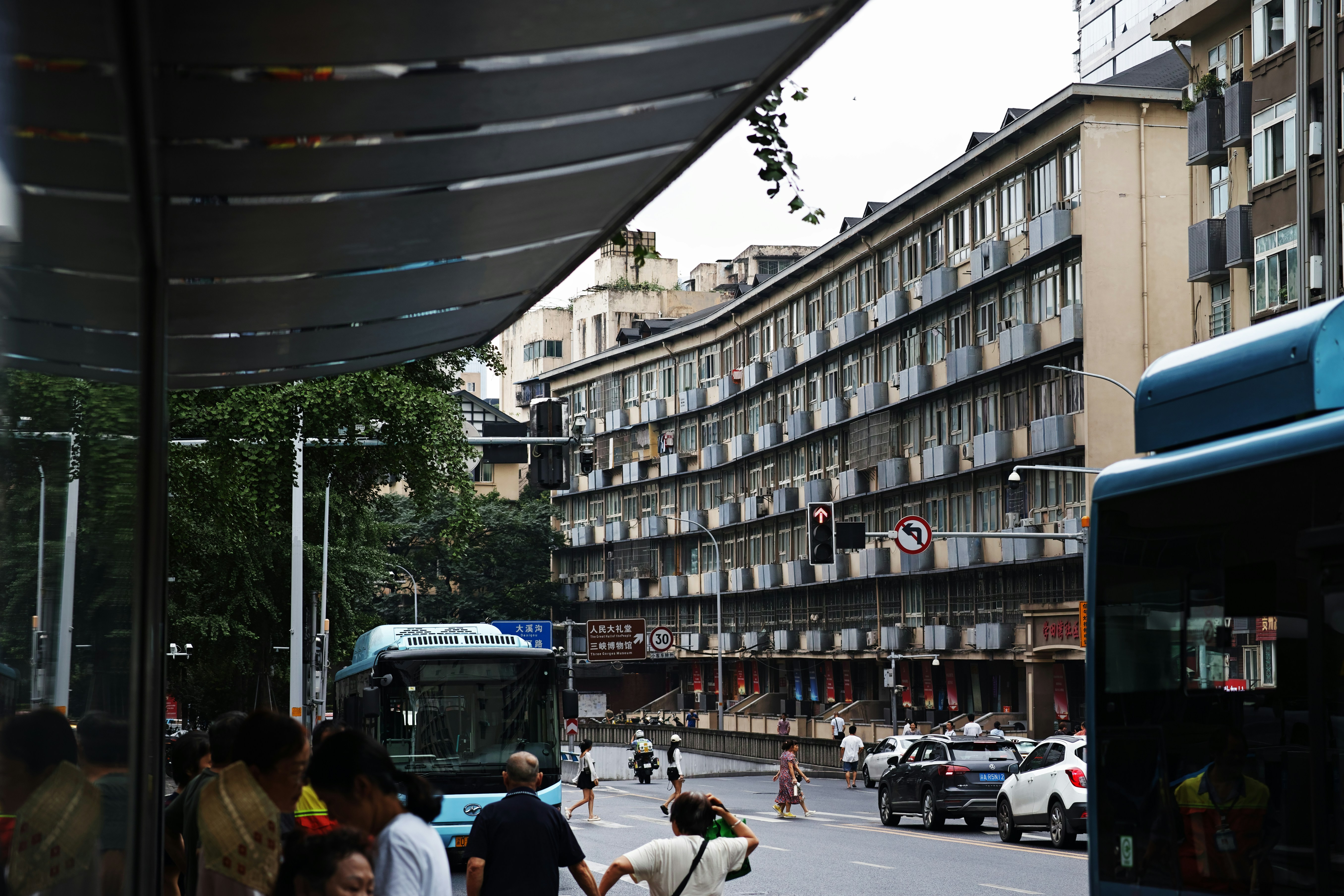 City street with buses and buildings