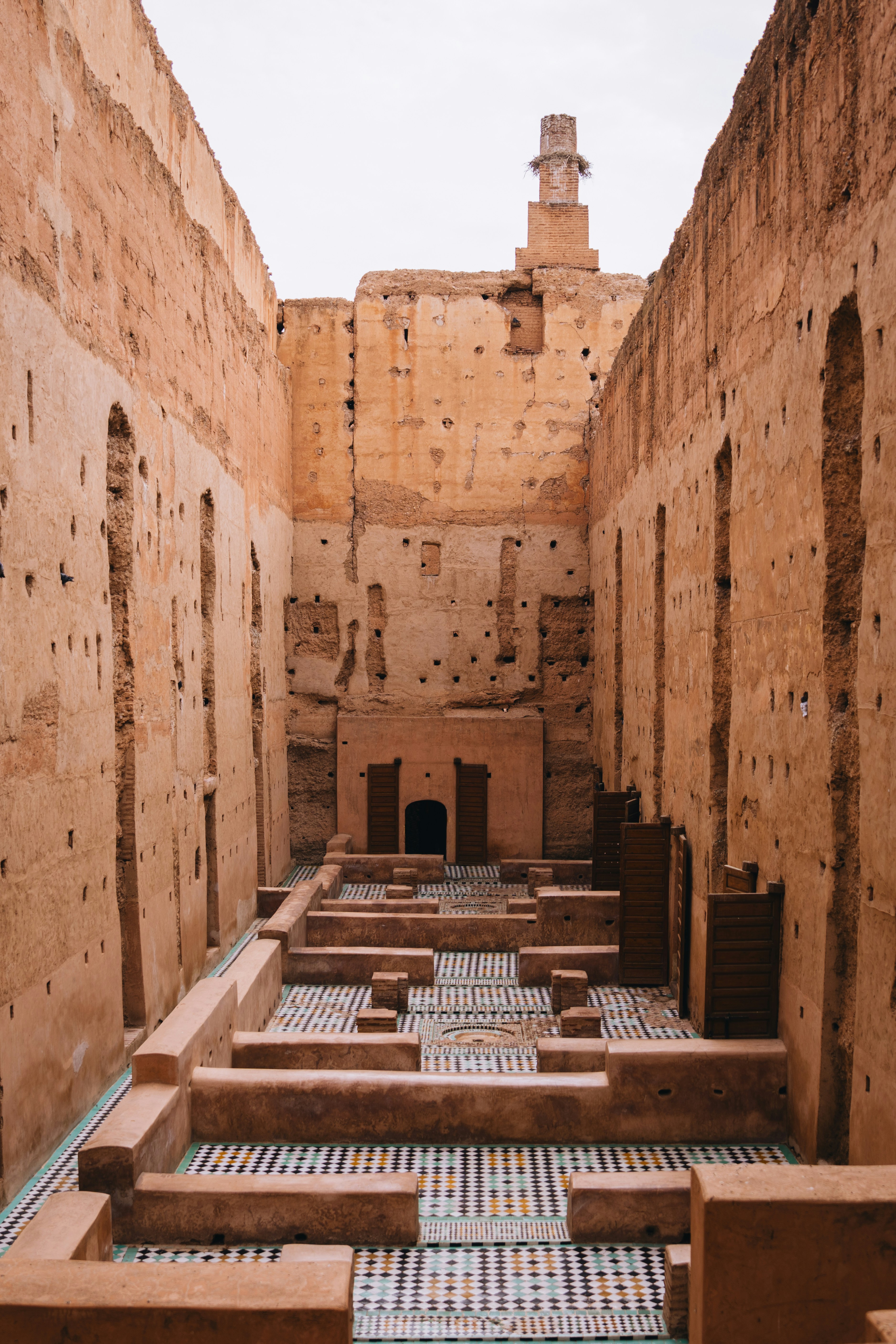 Ancient ruins with mosaic tiles and a minaret. photo – Free ...