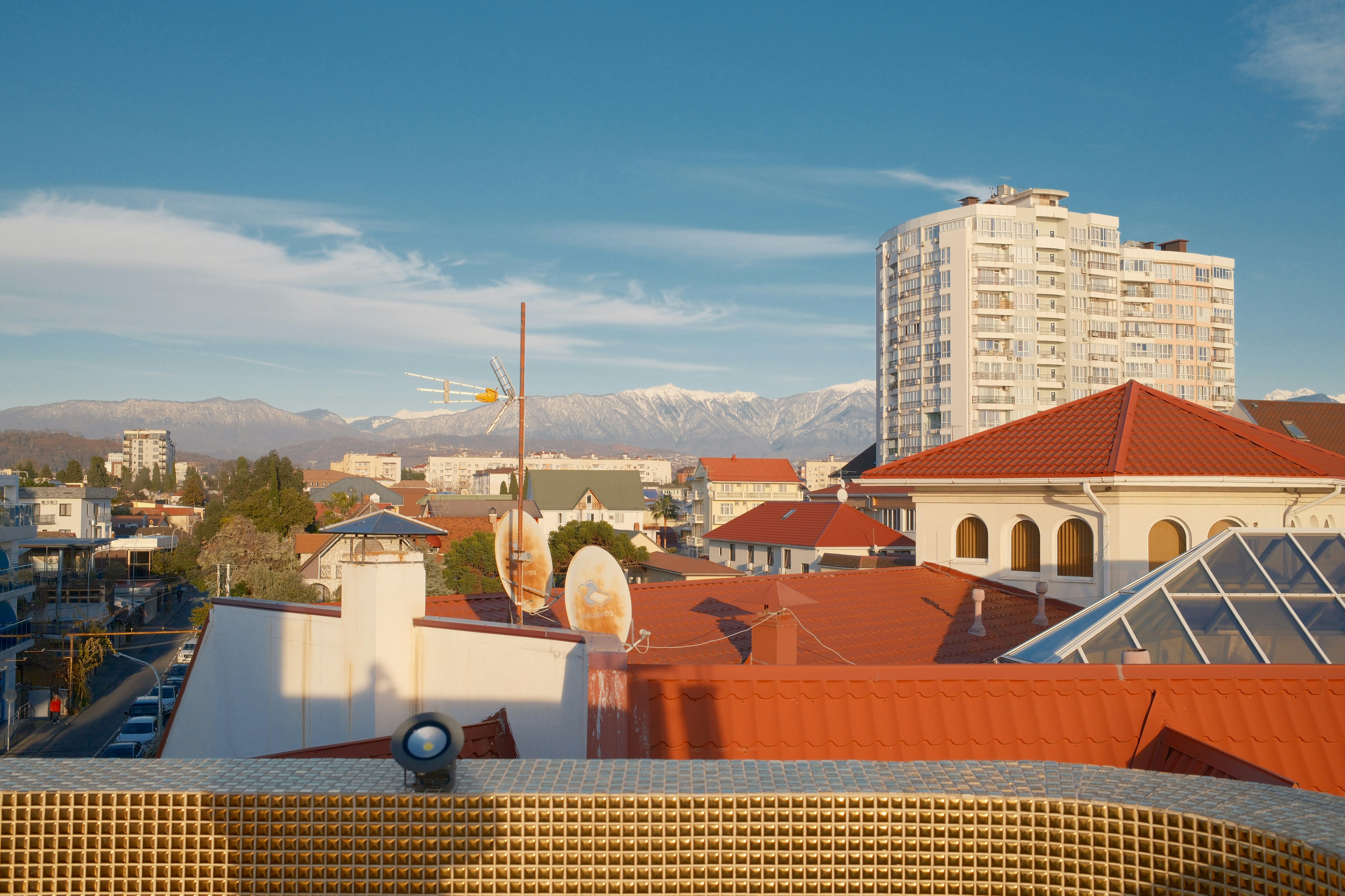 Urban Tapestry with a Mountain Backdrop