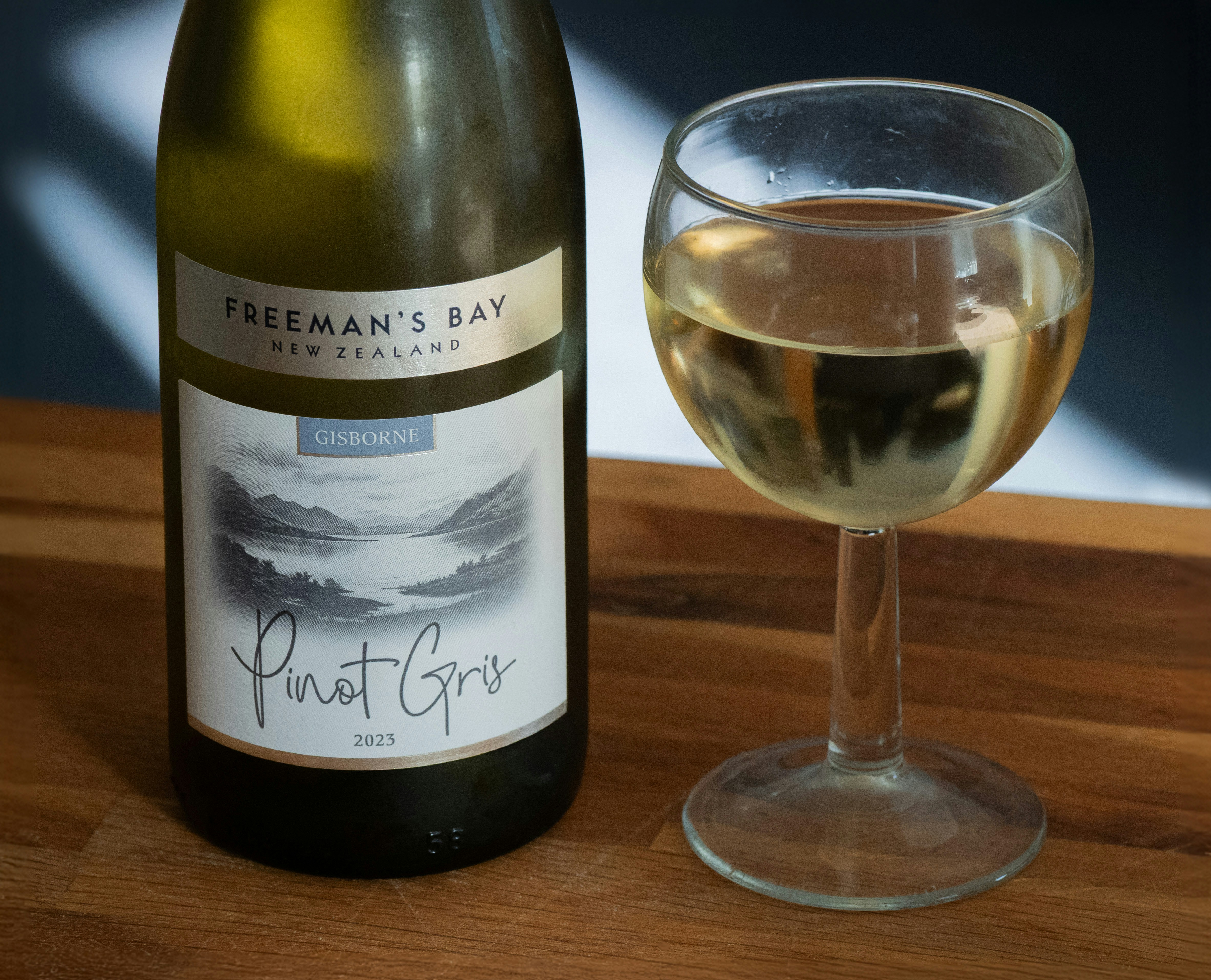 Bottle of Pinot Gris & Wine Glass | Bottle of pinot gris with a glass of white wine