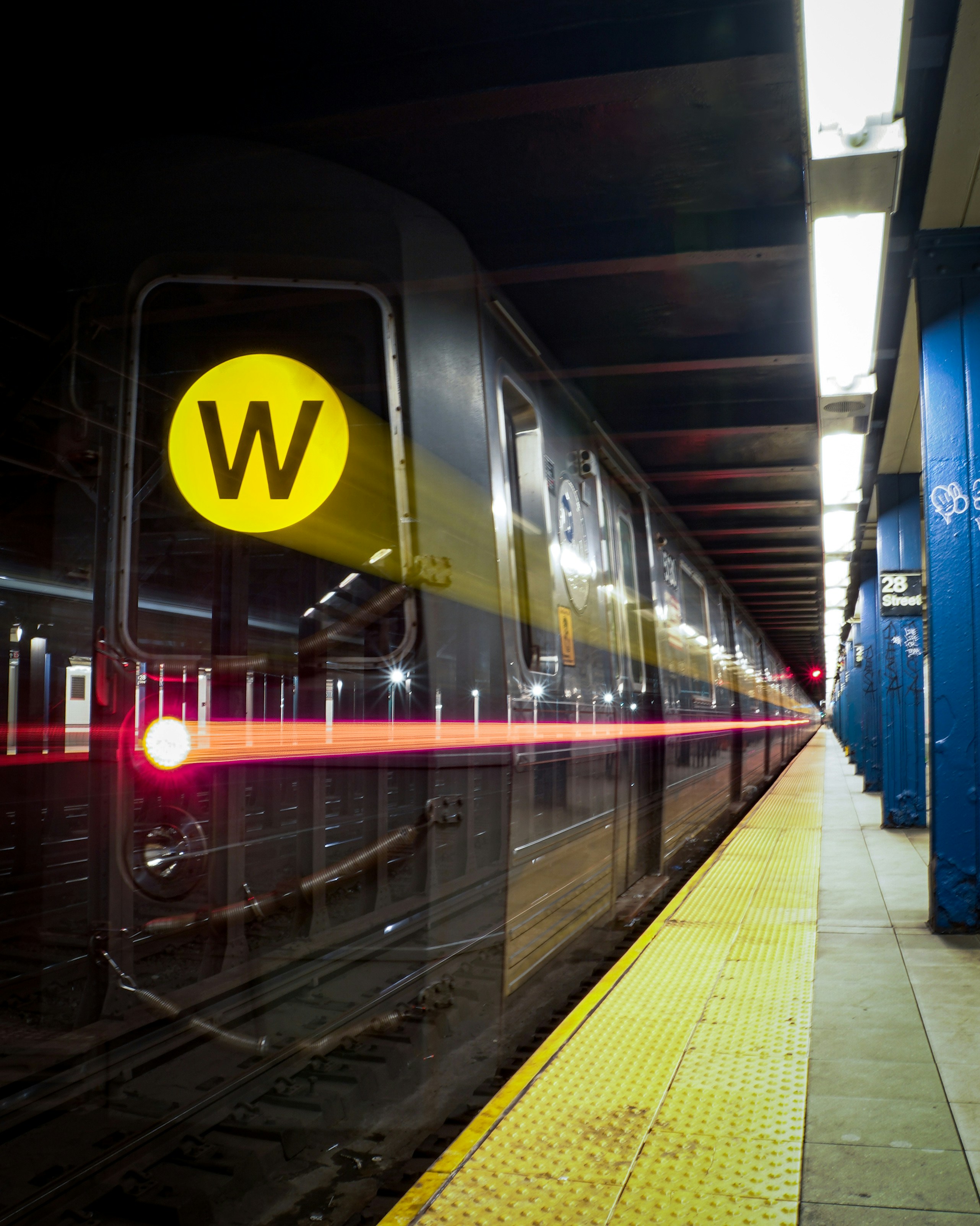 W Signal on the Subway: A Long-Exposure Glimpse of the Night Platform